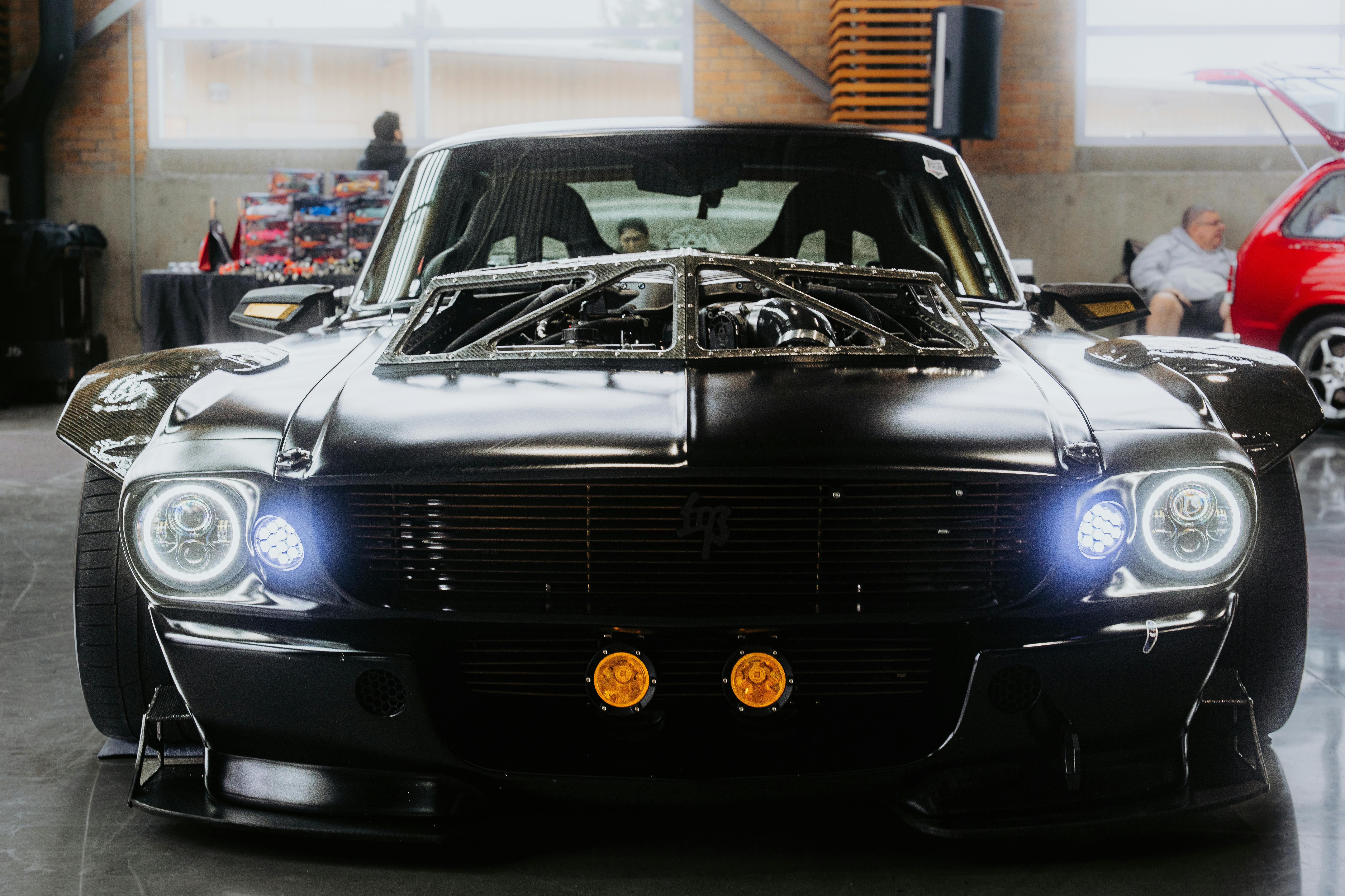 Classic Car Showroom with Modified Muscle Car · Free Stock Photo