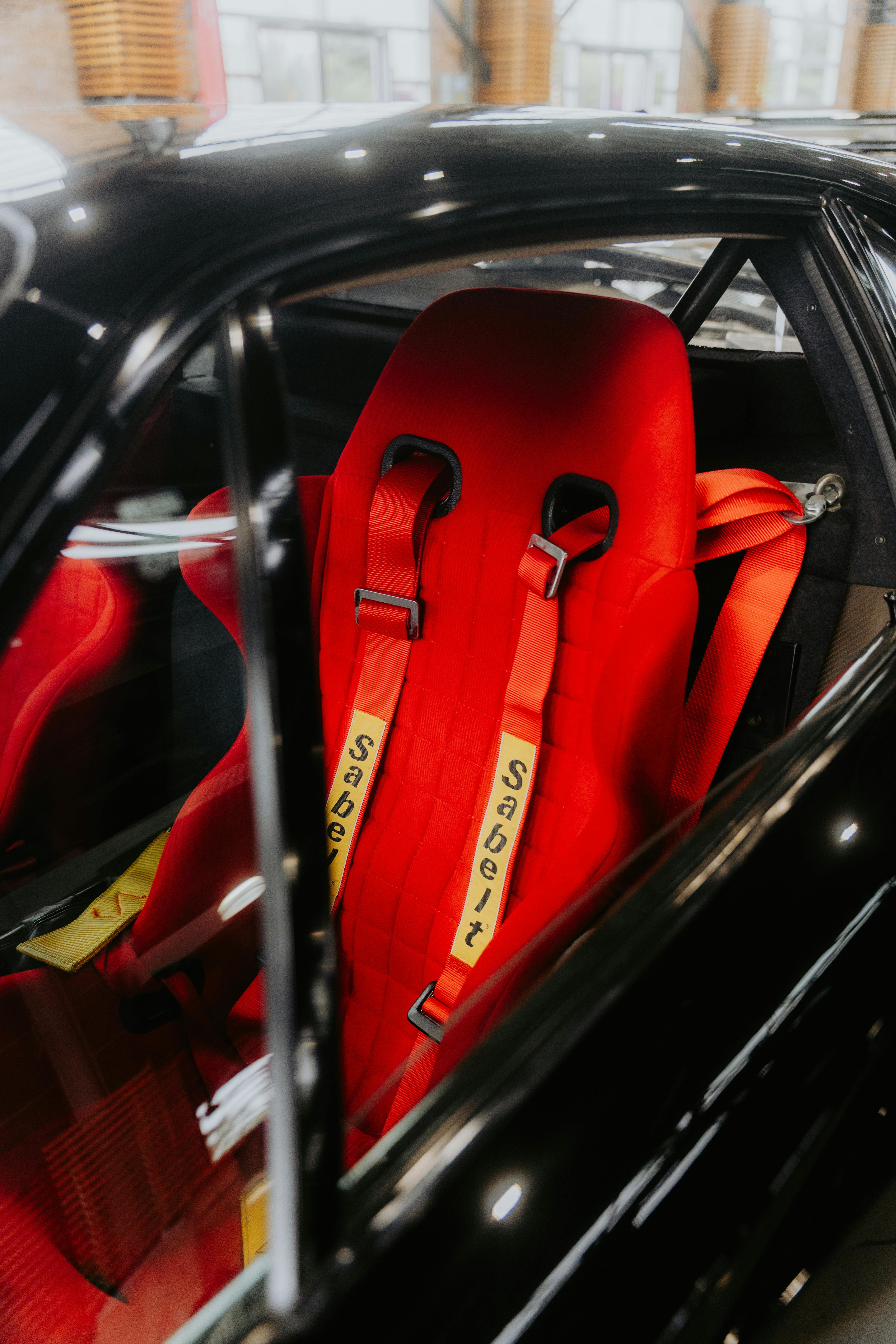 Close-up of Red Racing Car Seat with Harness · Free Stock Photo