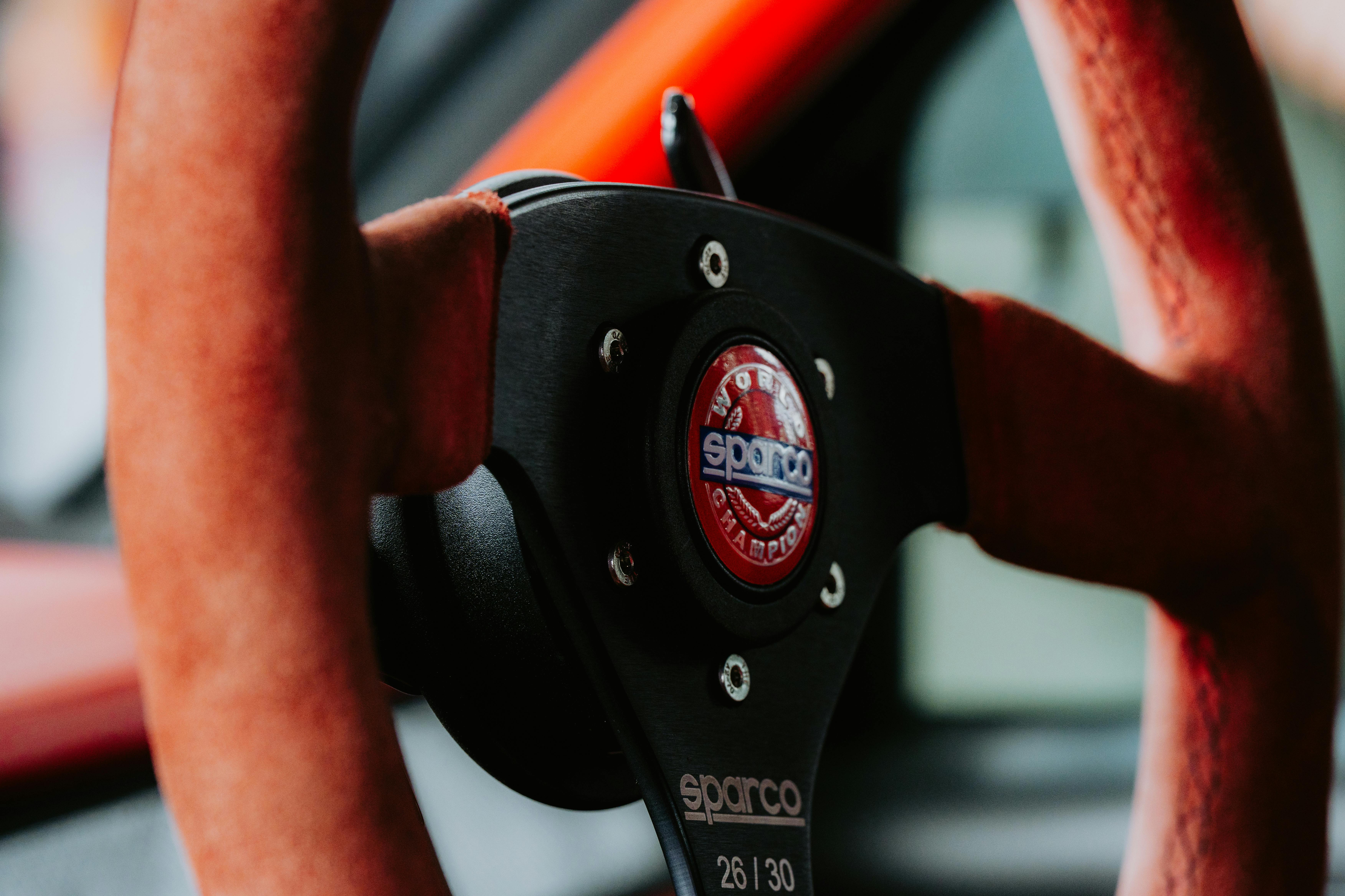 Close-Up of Sparco Racing Steering Wheel · Free Stock Photo