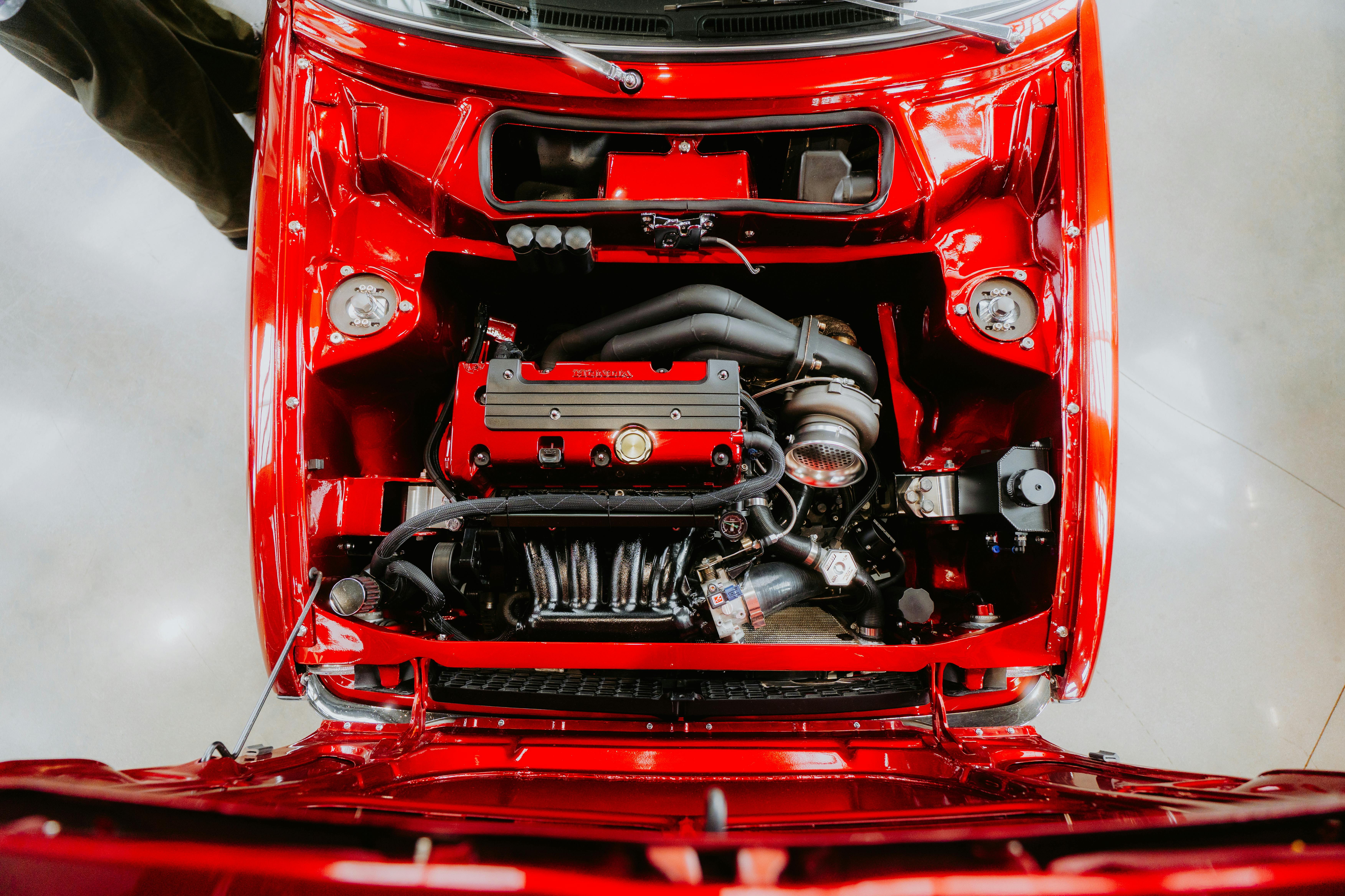 Close-up of Engine in Red Car from Above · Free Stock Photo