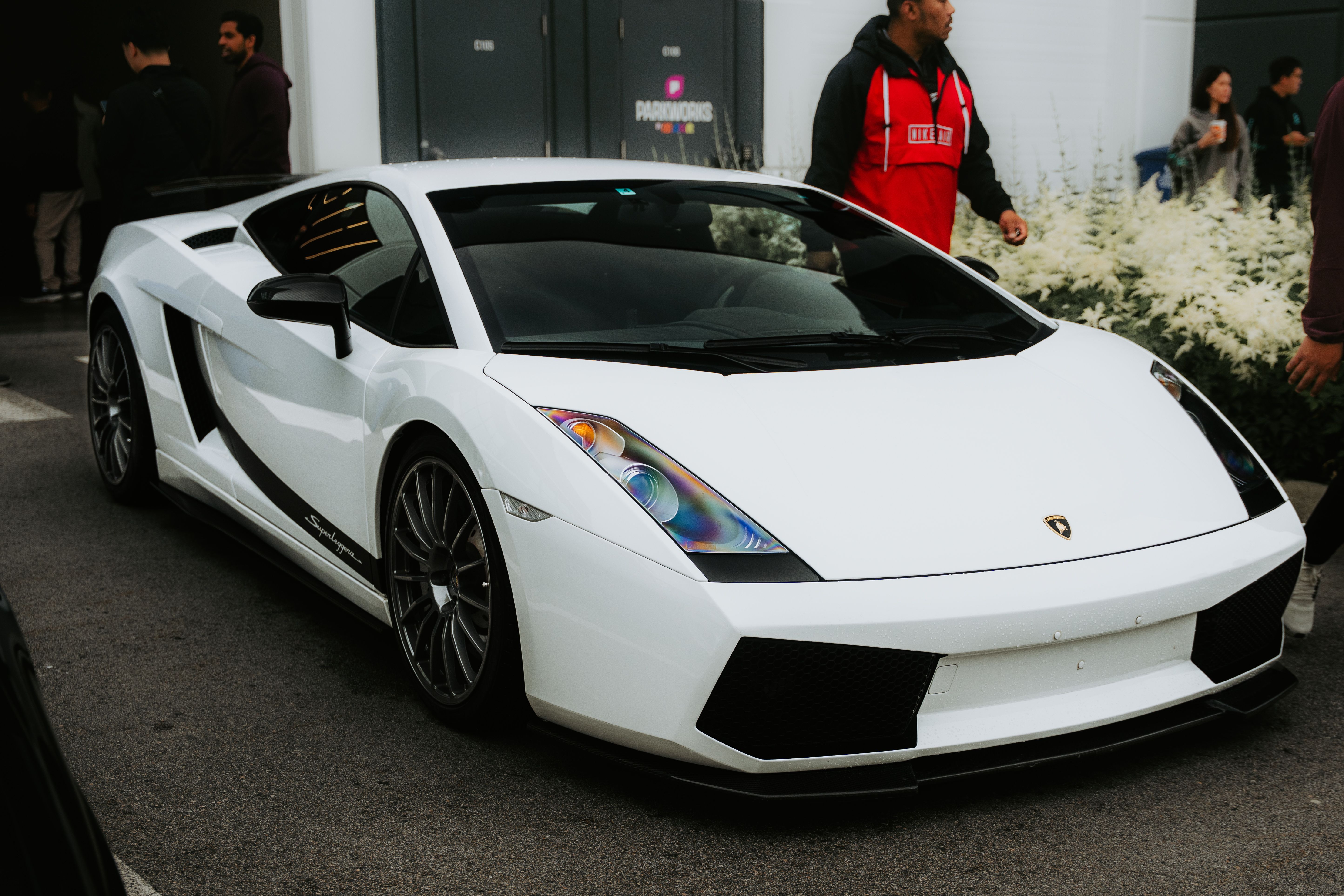 Luxury White Sports Car in Urban Setting · Free Stock Photo