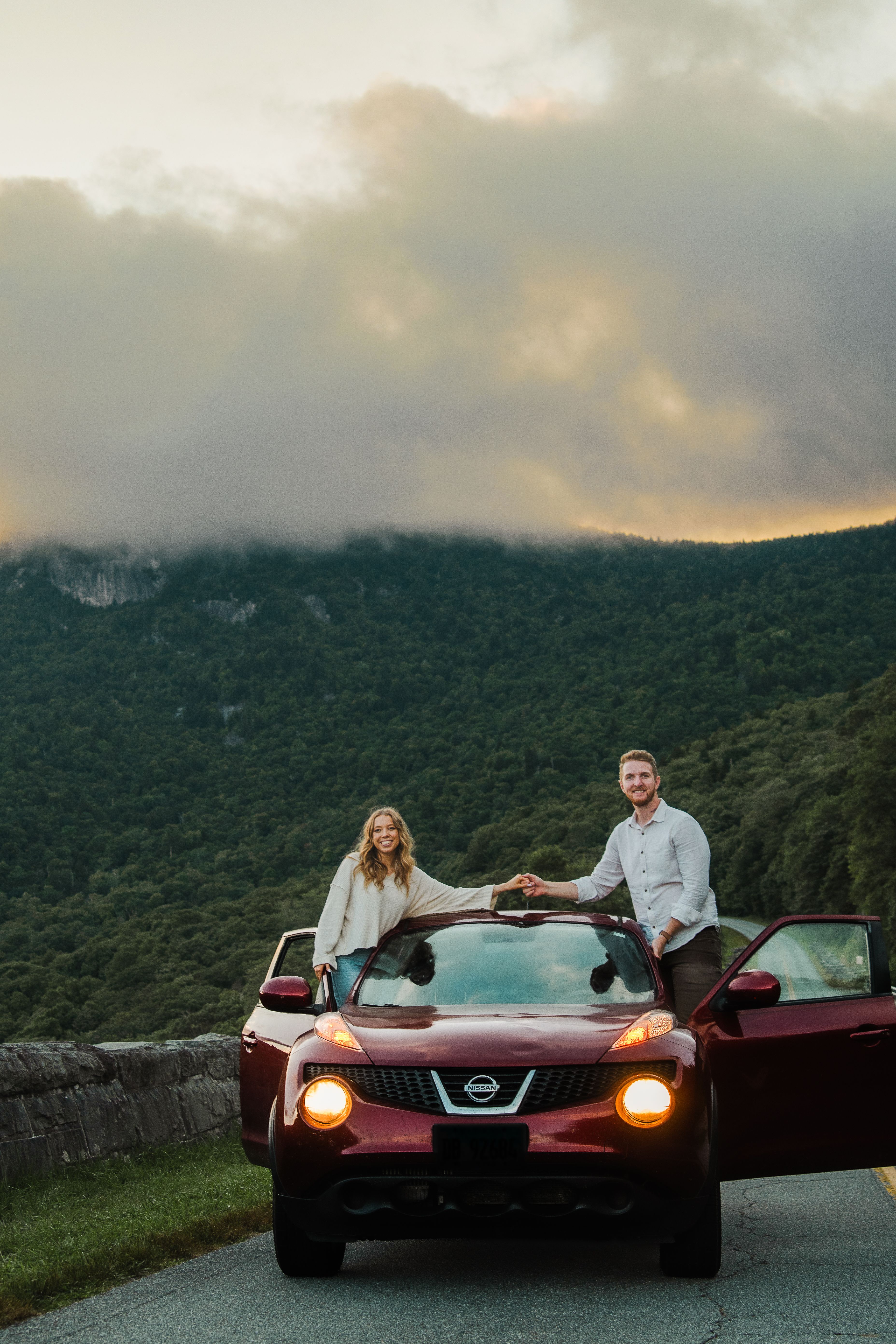 Couple Enjoying Scenic Drive in Convertible · Free Stock Photo