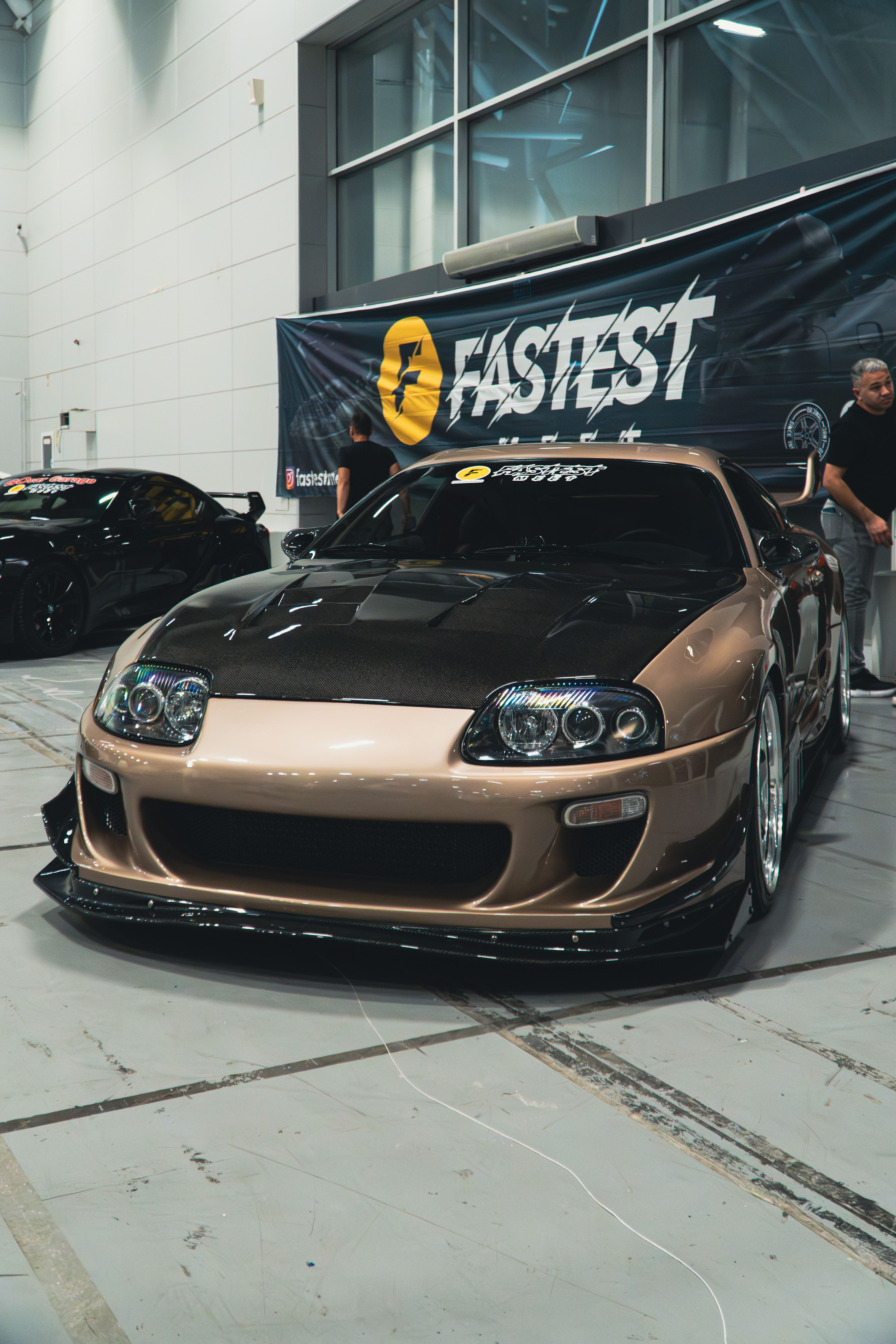 Modified Toyota Supra in Indoor Car Show · Free Stock Photo