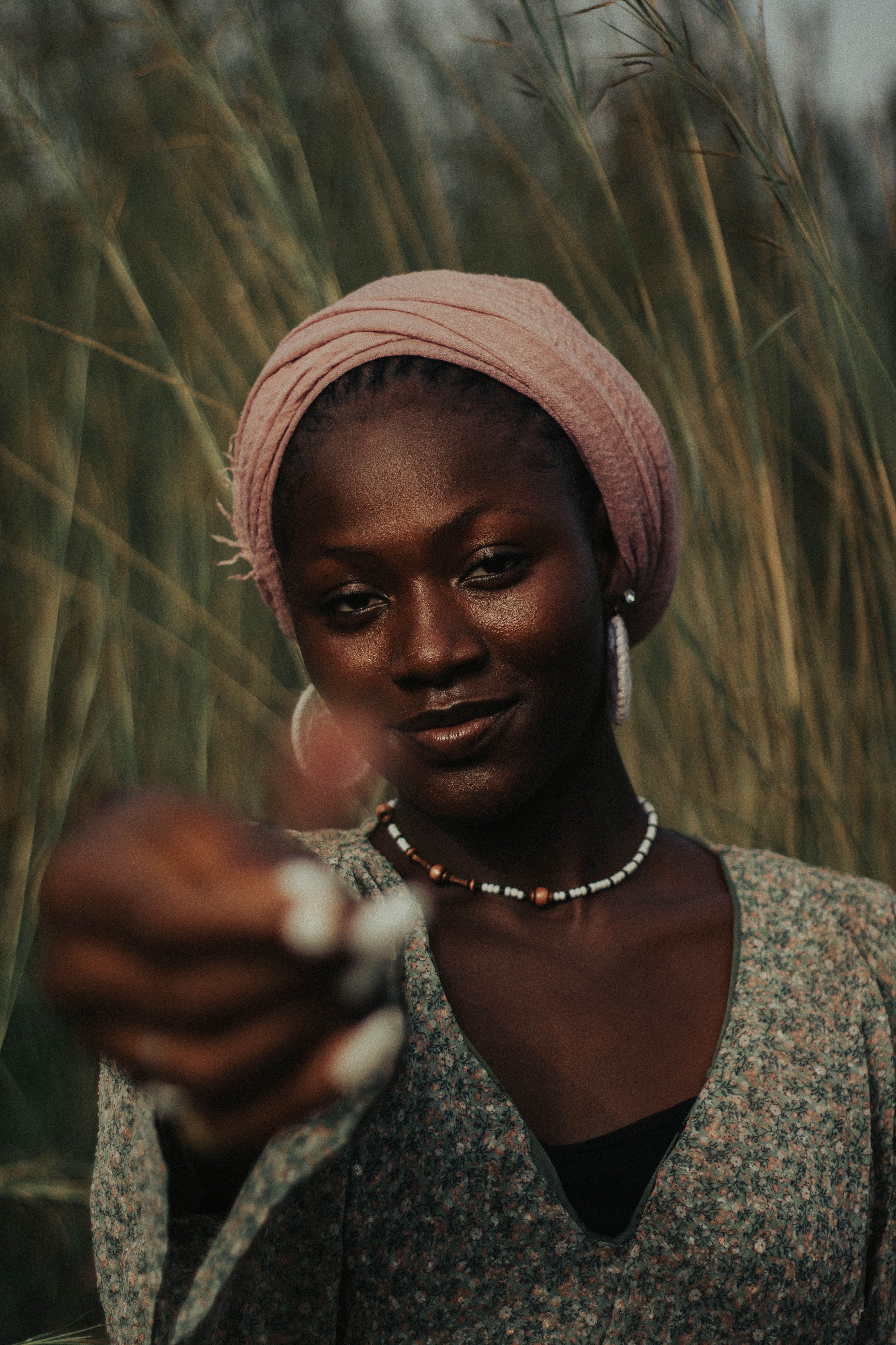 Portrait of a Woman in Nature with Peaceful Expression · Free Stock Photo