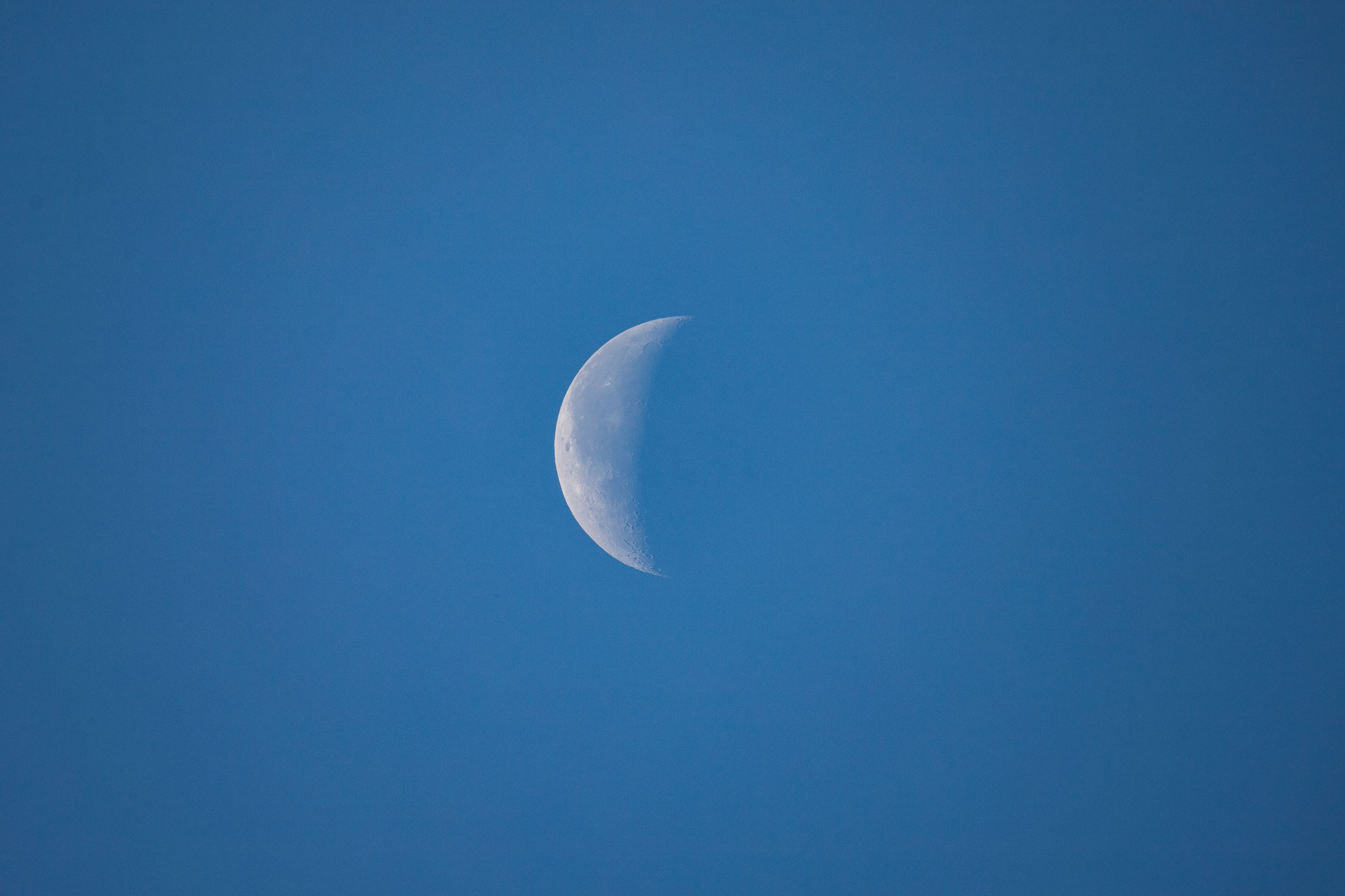 Crescent Moon in Clear Daytime Sky · Free Stock Photo