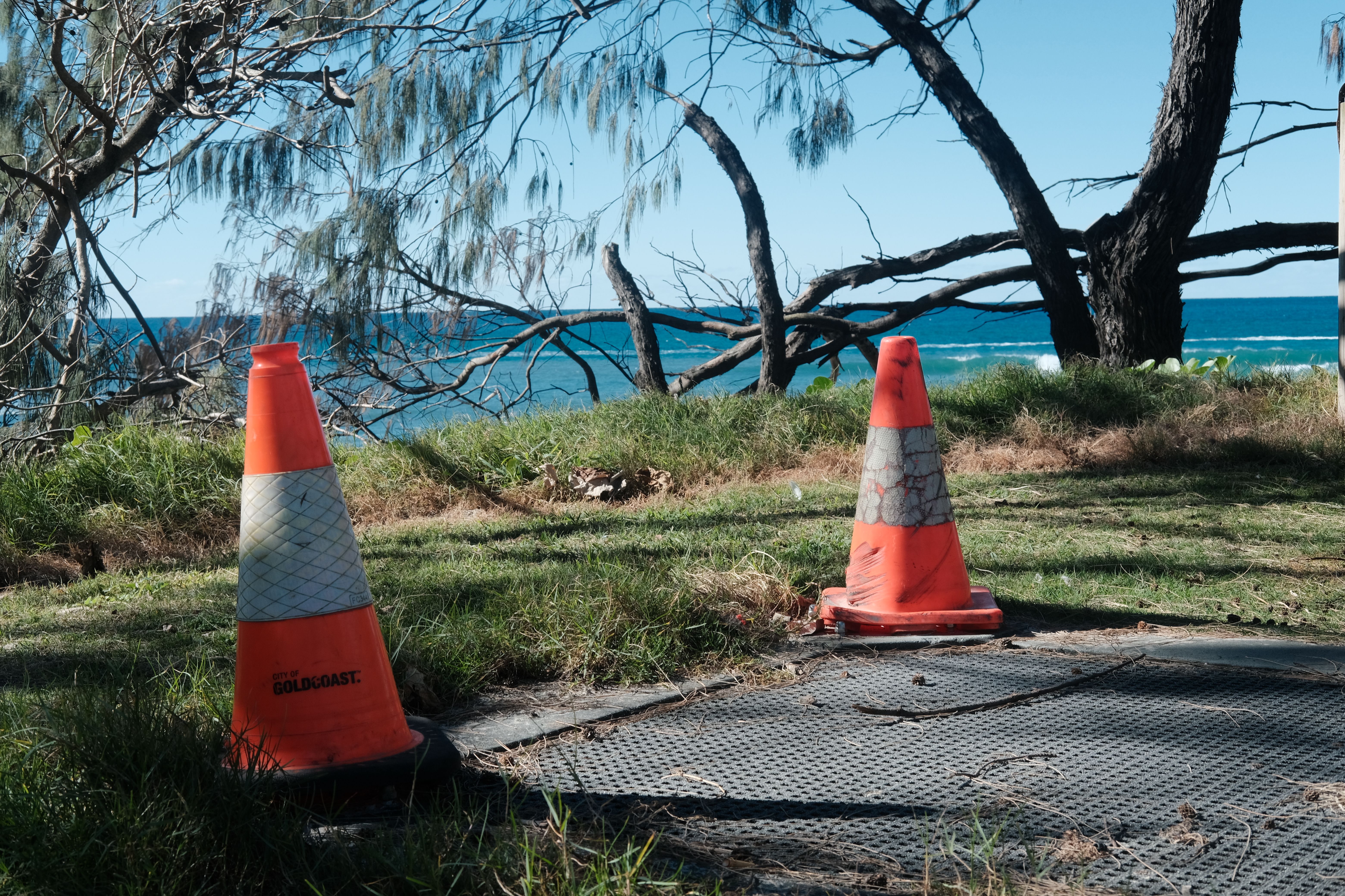 Traffic Cones by Coastal Path on a Sunny Day · Free Stock Photo