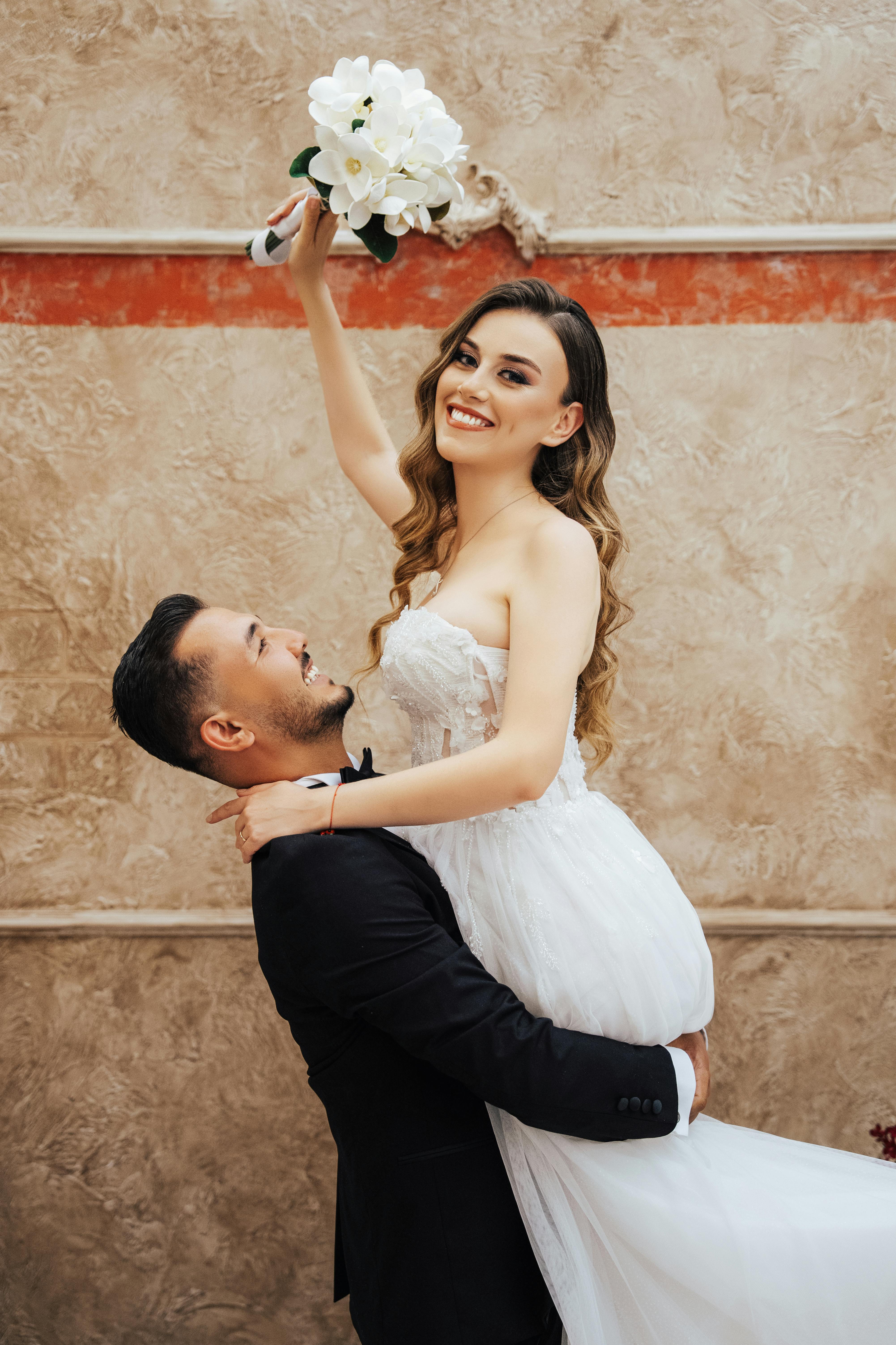 Groom Kissing Bride Neck · Free Stock Photo