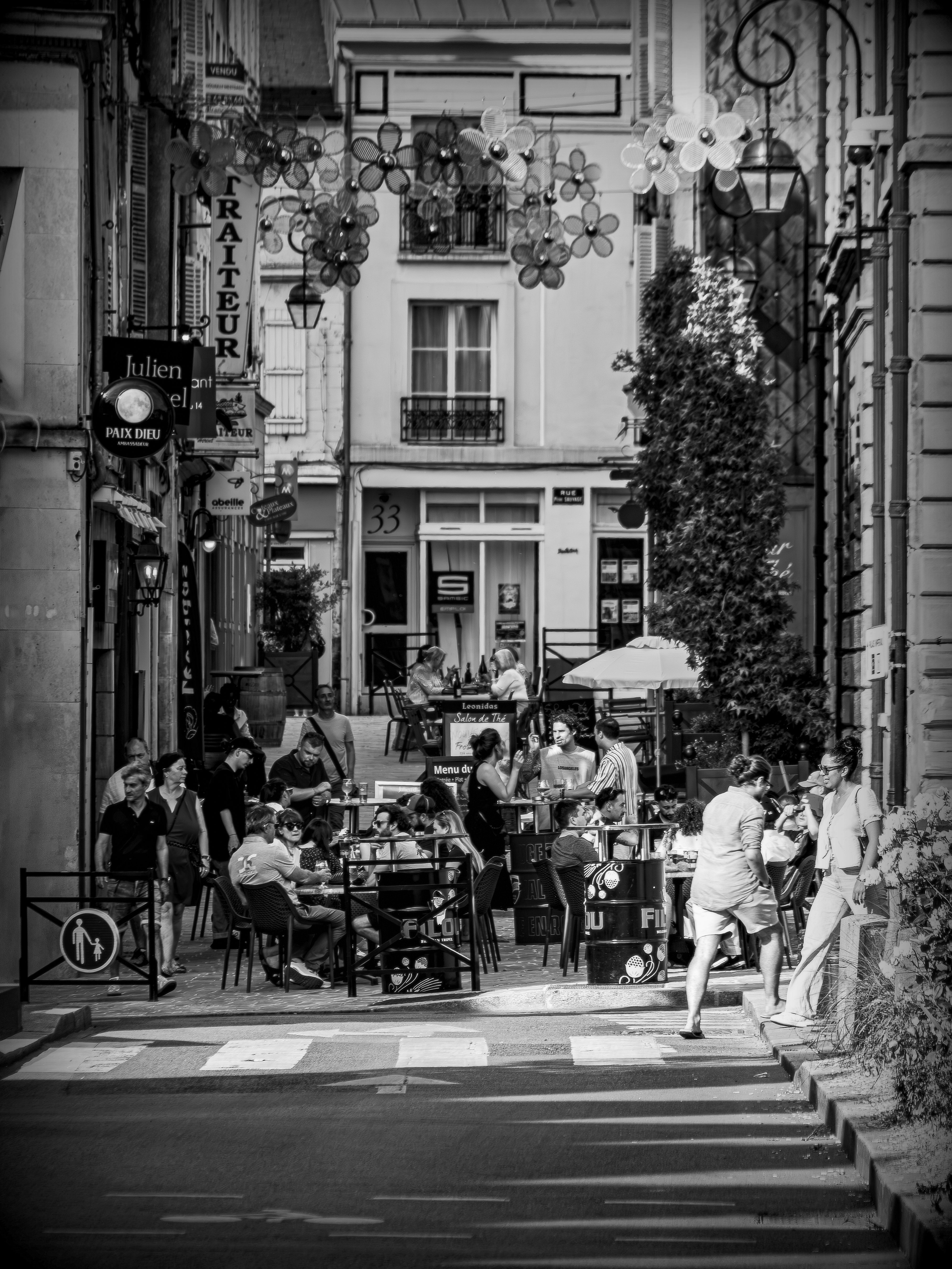 Charming Outdoor Cafe in a Quaint Parisian Alley · Free Stock Photo