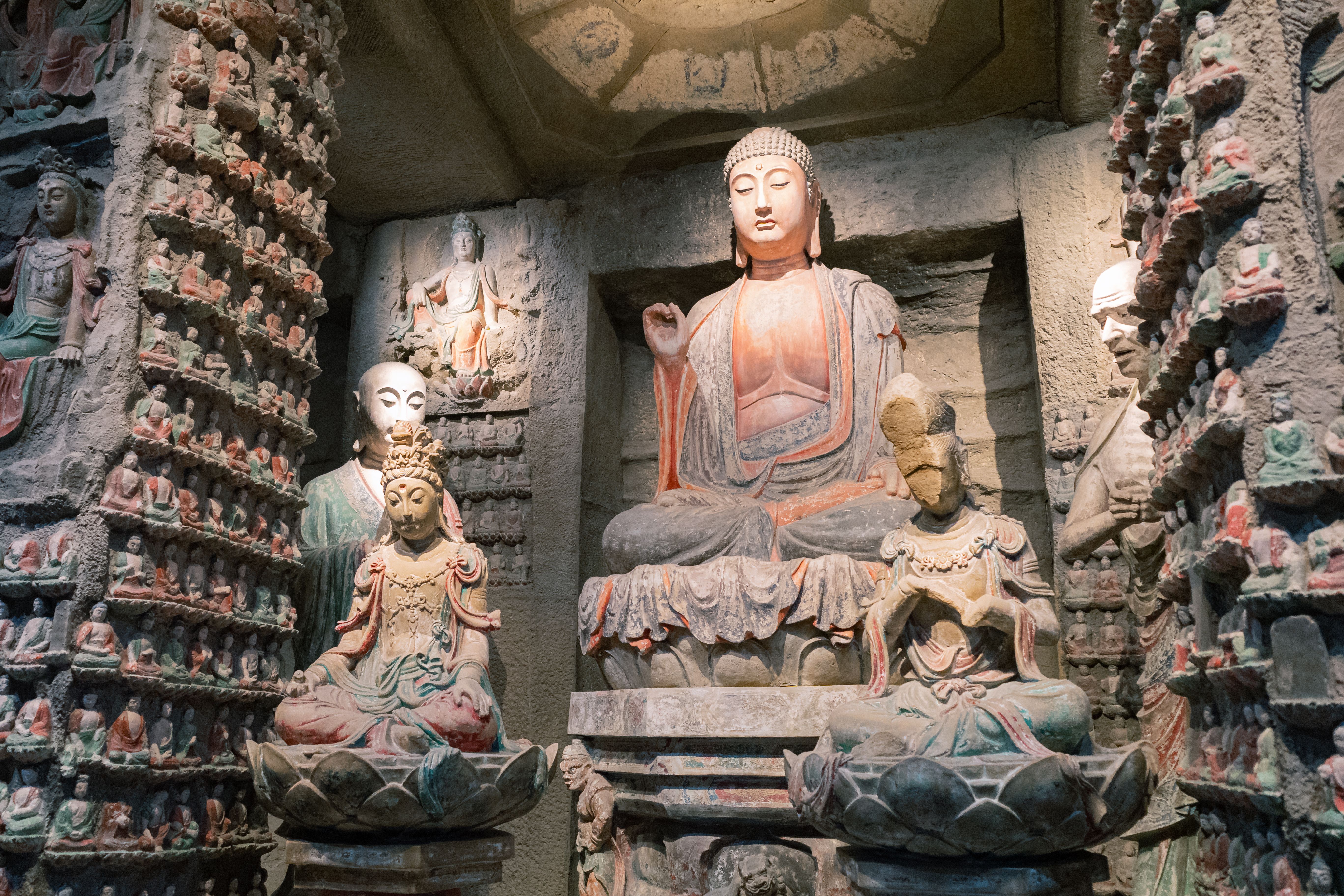 Intricate Buddhist Stone Carvings in Cave Temple · Free Stock Photo