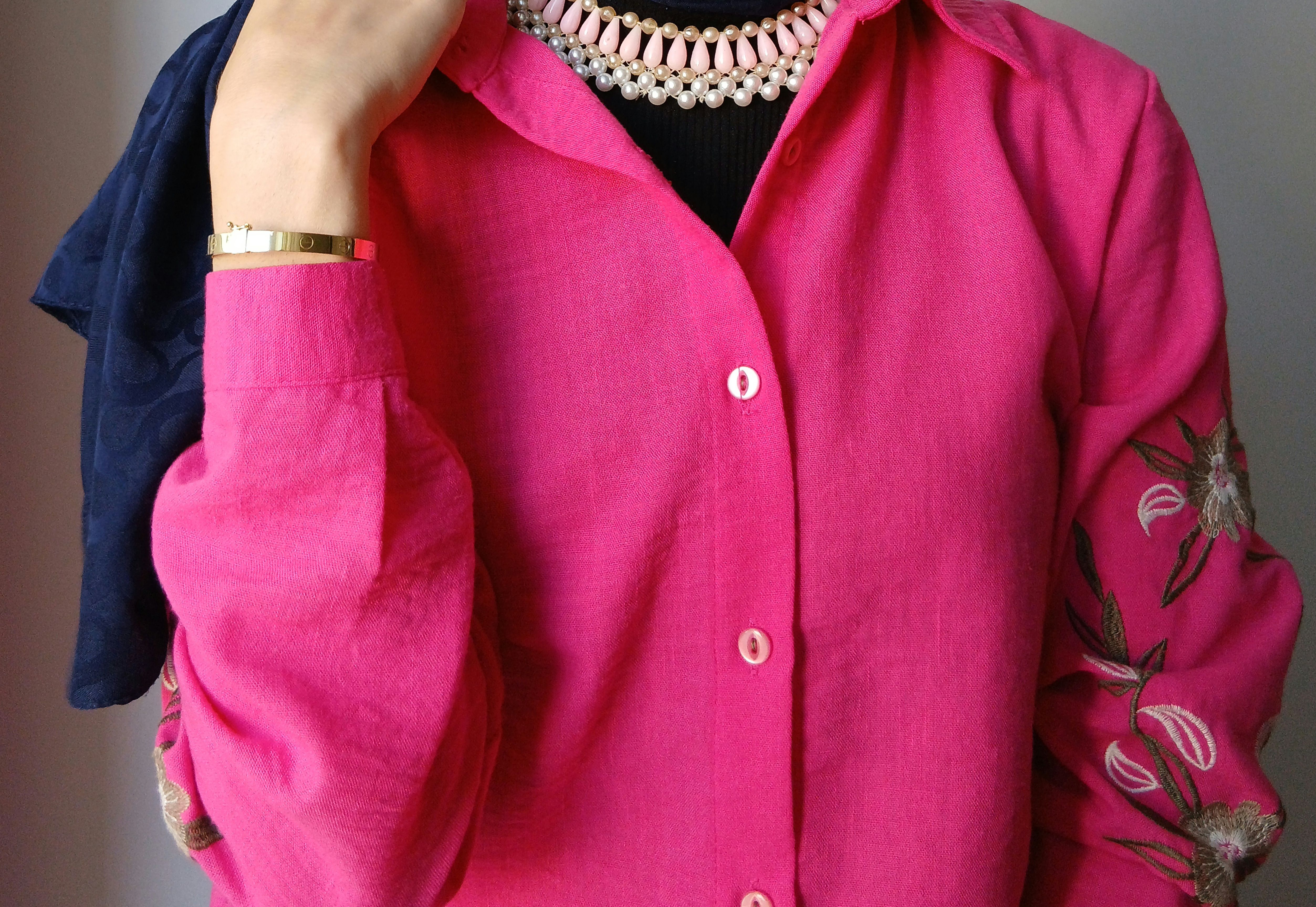 Close-up of Stylish Embroidered Pink Shirt · Free Stock Photo