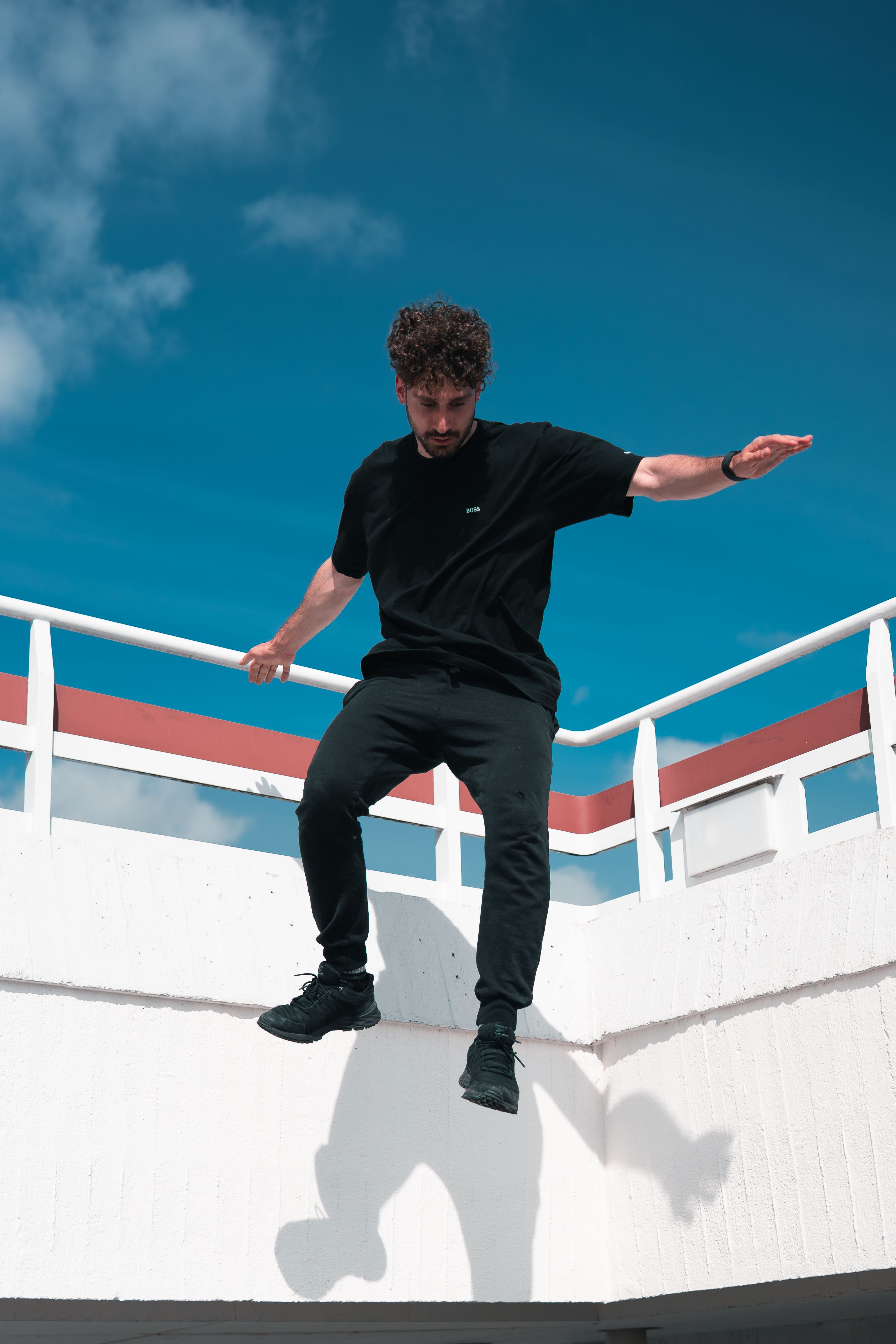 Dynamic Parkour Jump in Berlin Urban Setting · Free Stock Photo