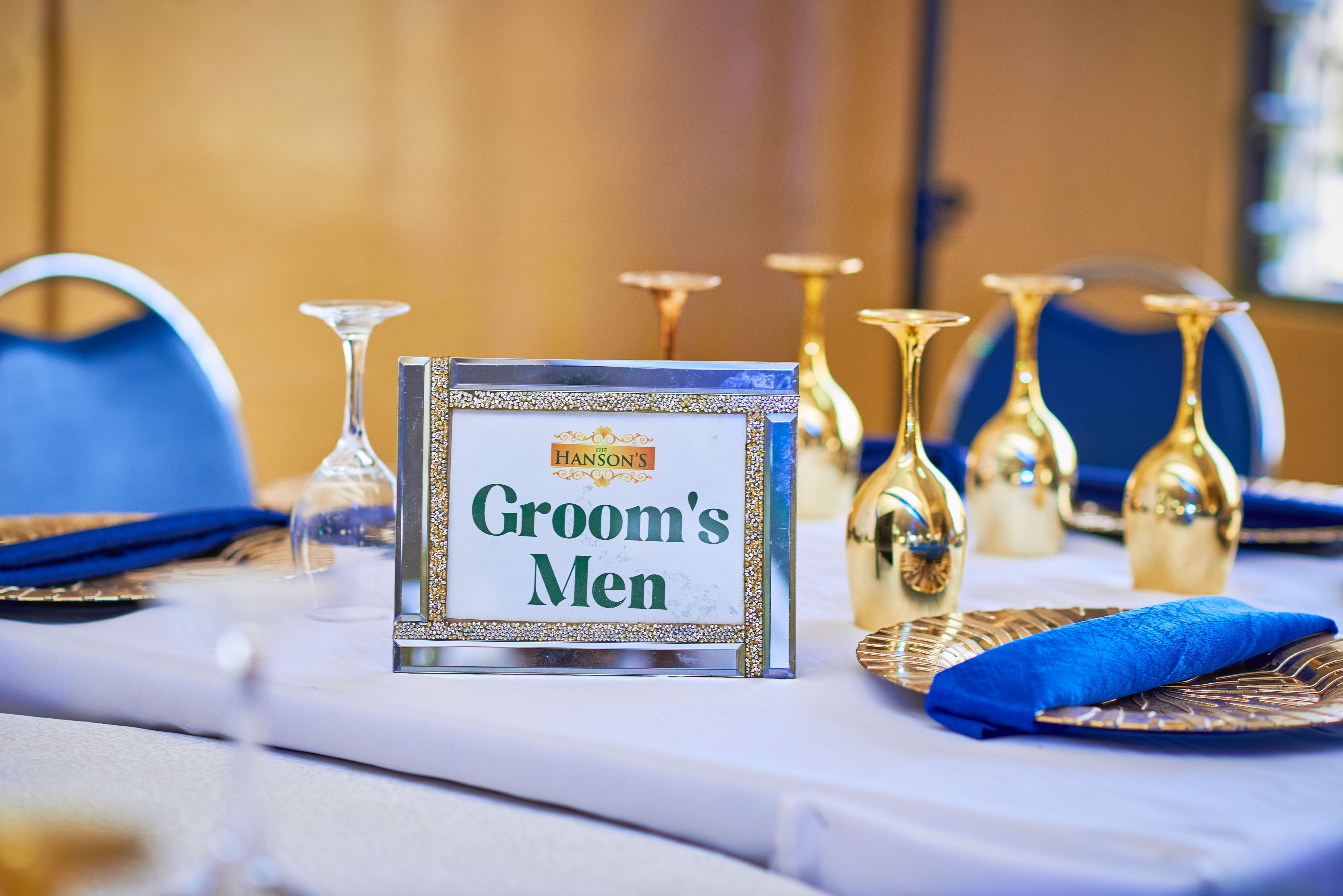 Elegant Wedding Table Setup with Groom's Men Sign · Free Stock Photo