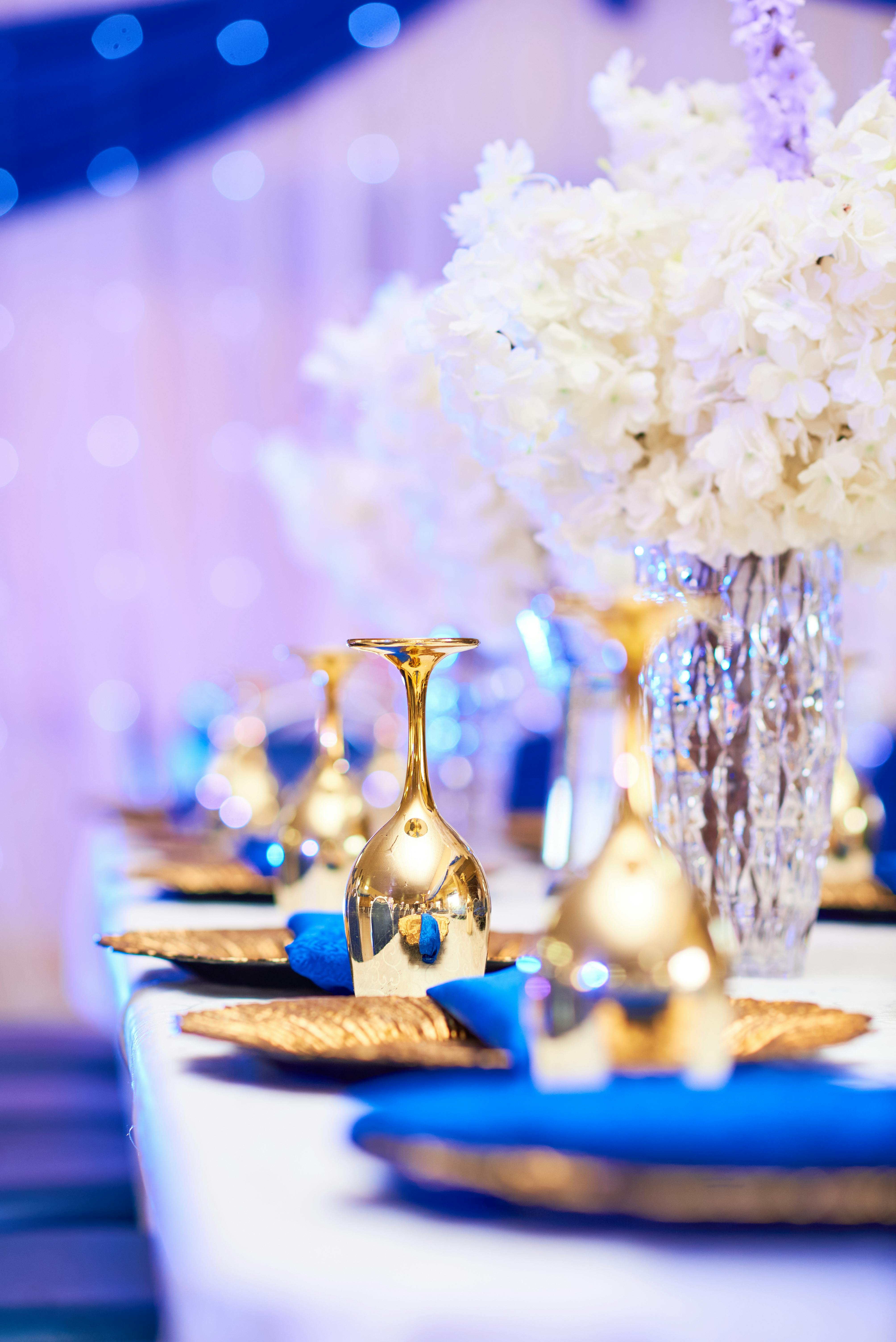 Elegant Wedding Table Setting with Gold Accents · Free Stock Photo