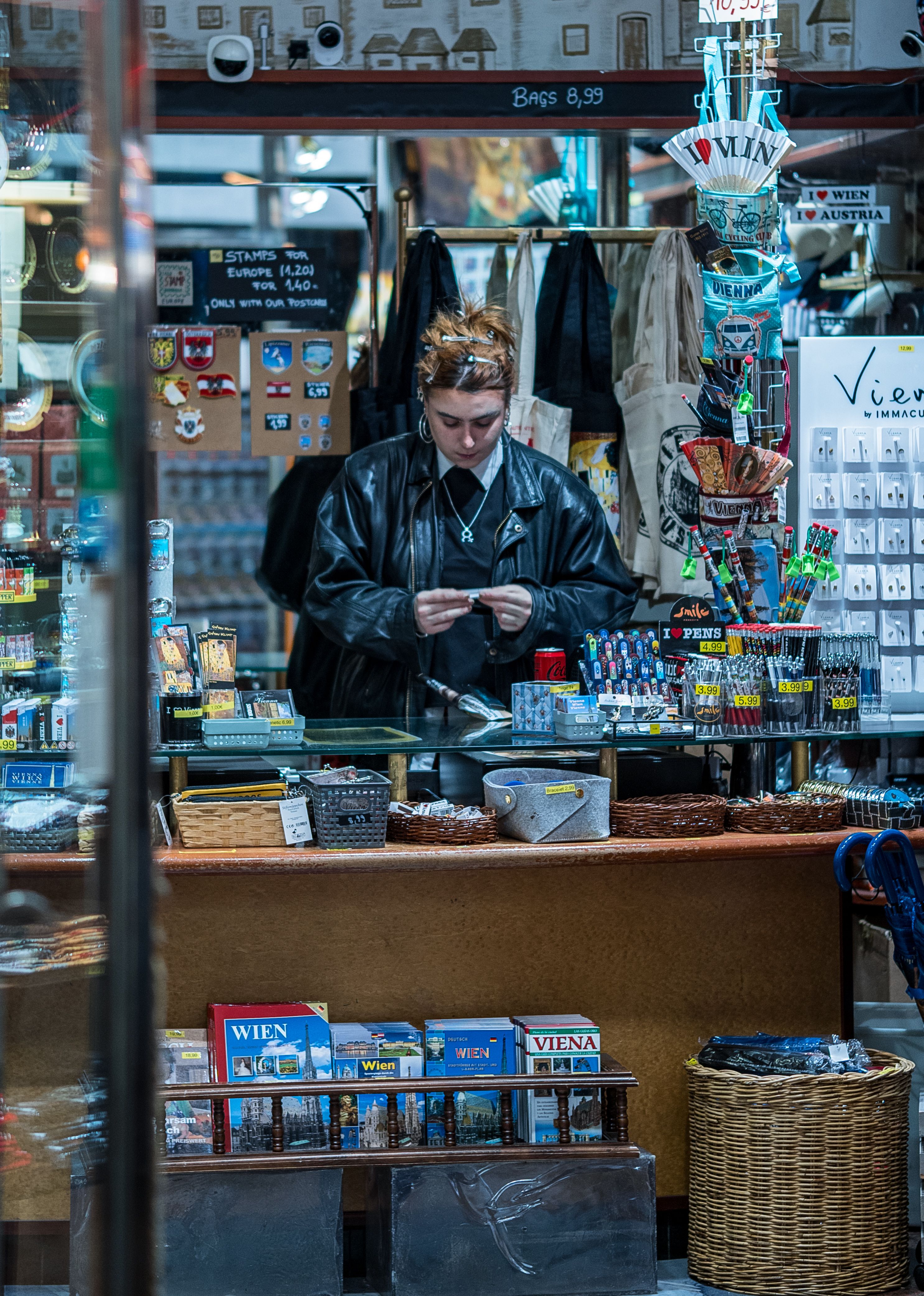 Young Adult in Souvenir Shop Vienna Cityscape · Free Stock Photo