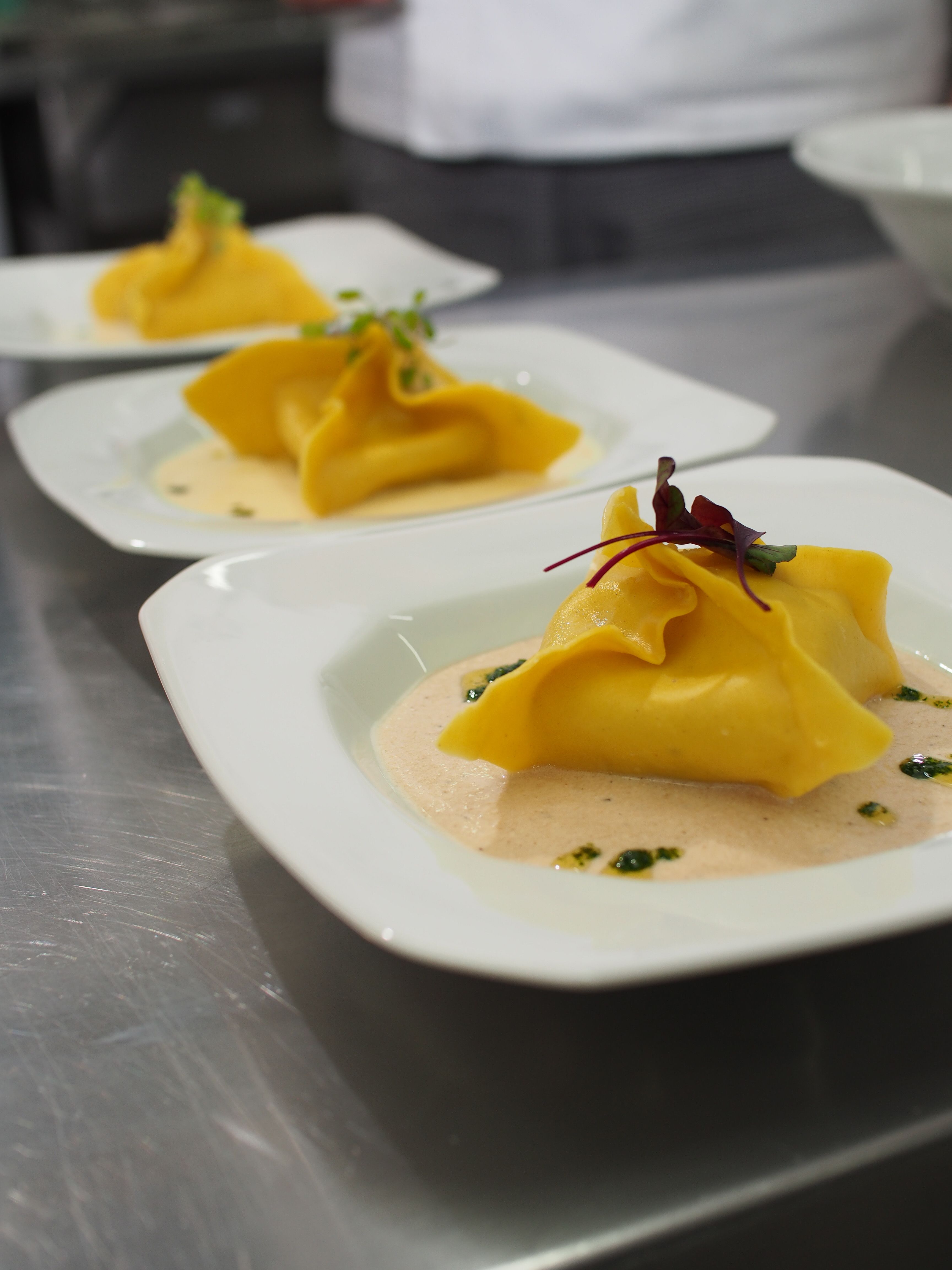 Close-up of Gourmet Ravioli on Restaurant Plates · Free Stock Photo