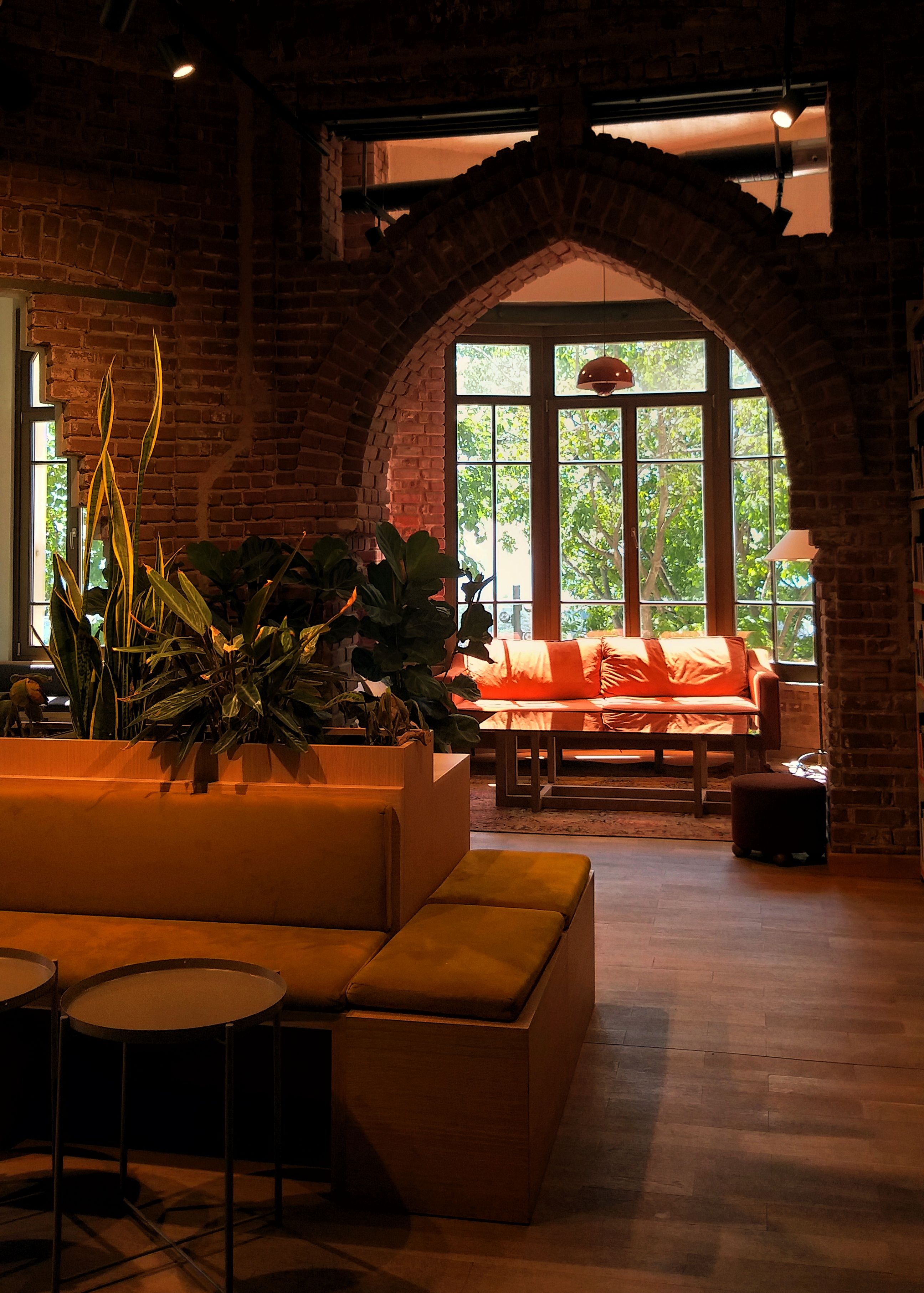 Cozy Indoor Lounge in Brick Interior Setting · Free Stock Photo