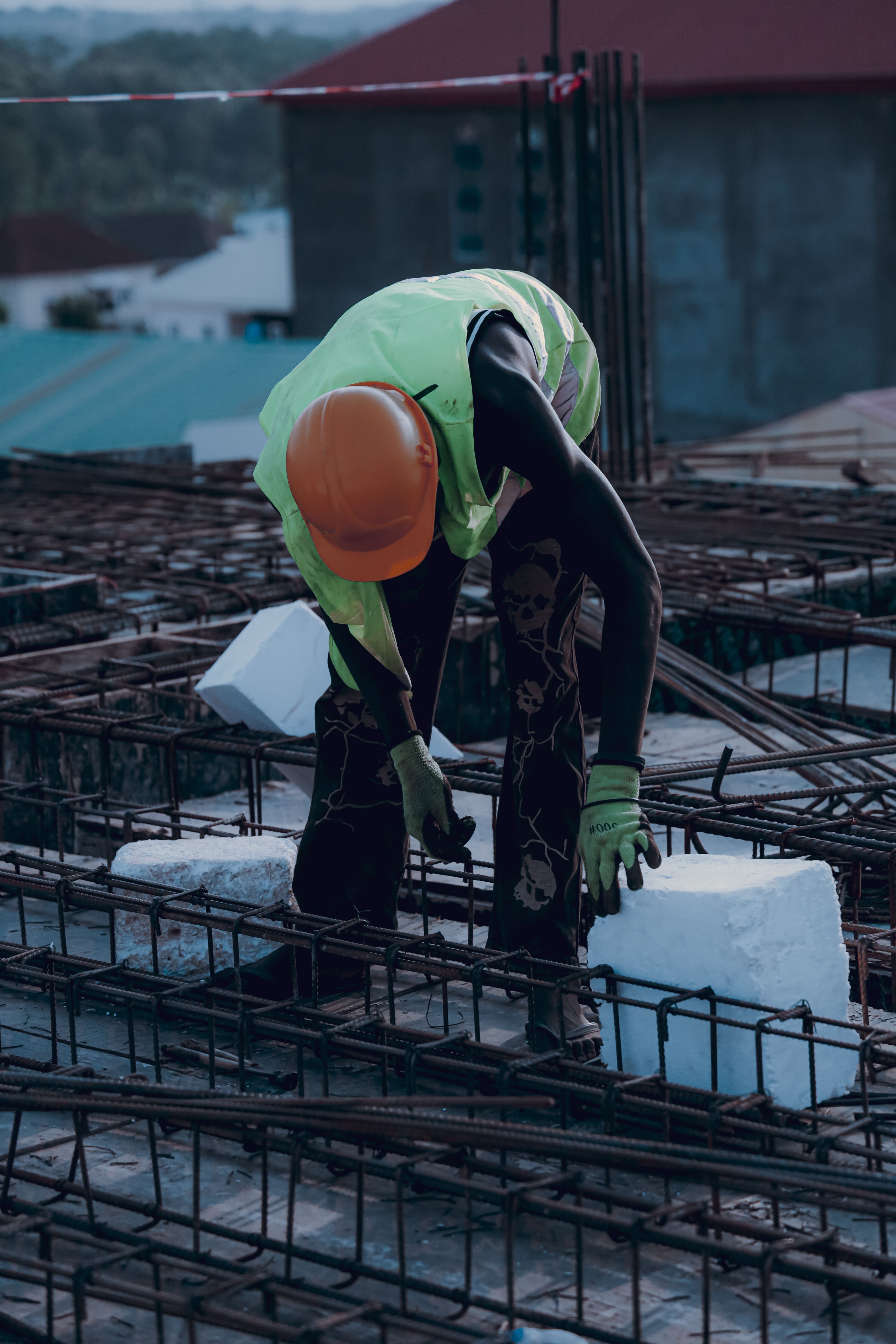 Construction Worker Walking Down the Corridor · Free Stock Photo