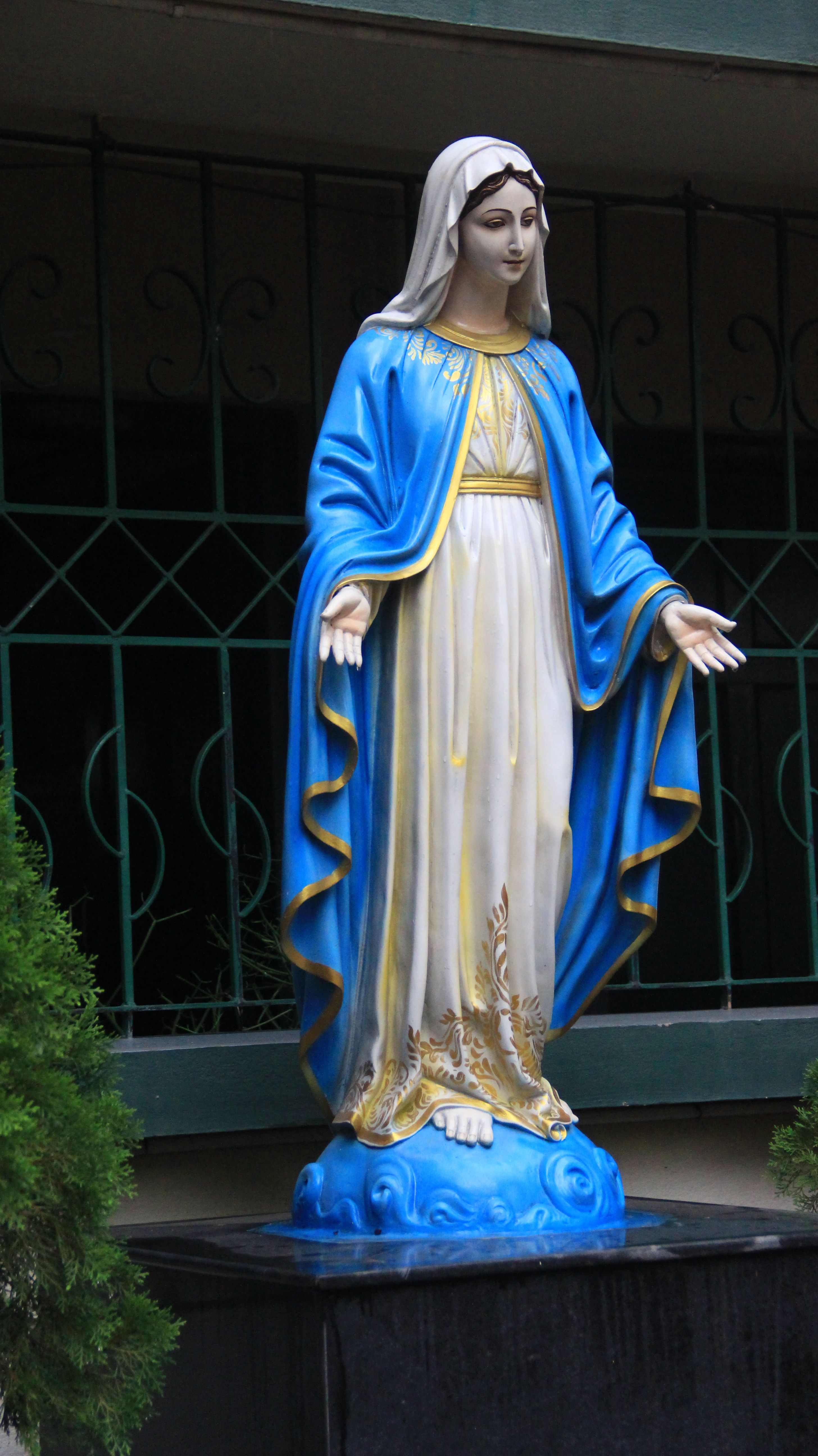 Statue of the Virgin Mary in Blue Cloak · Free Stock Photo