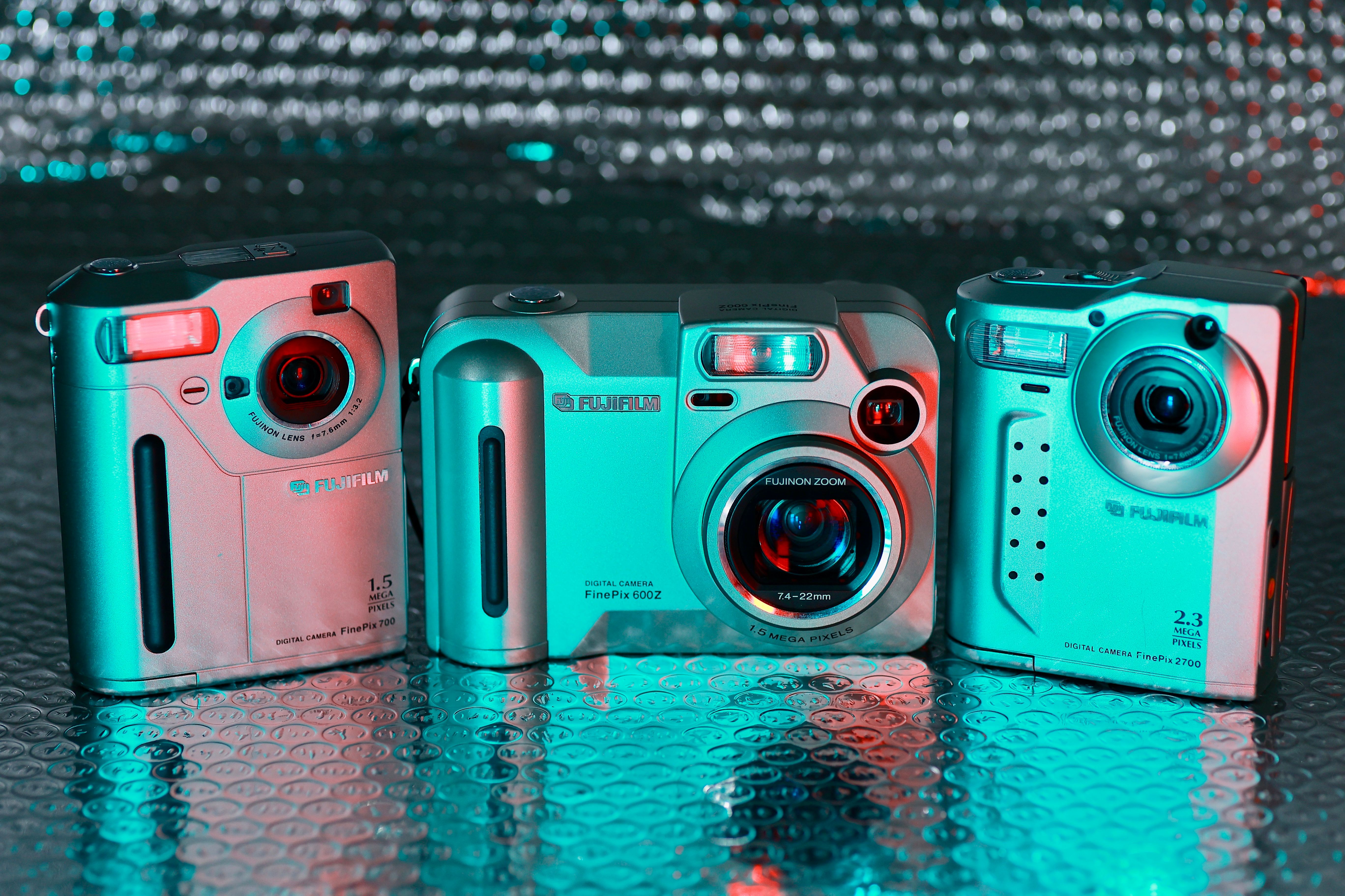 Retro Digital Cameras with Futuristic Lighting · Free Stock Photo