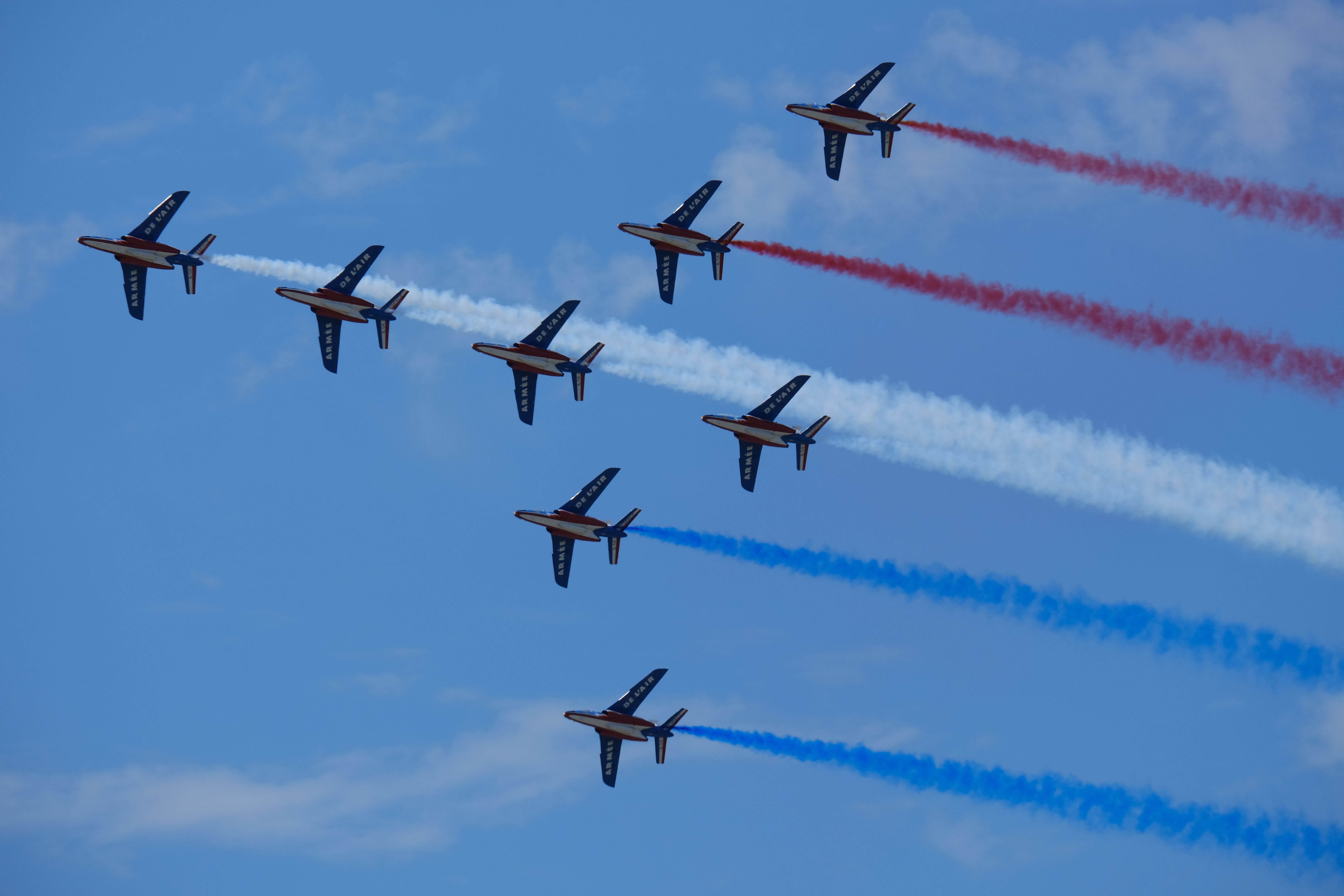 Colorful Aerobatic Display in Clear Blue Sky · Free Stock Photo
