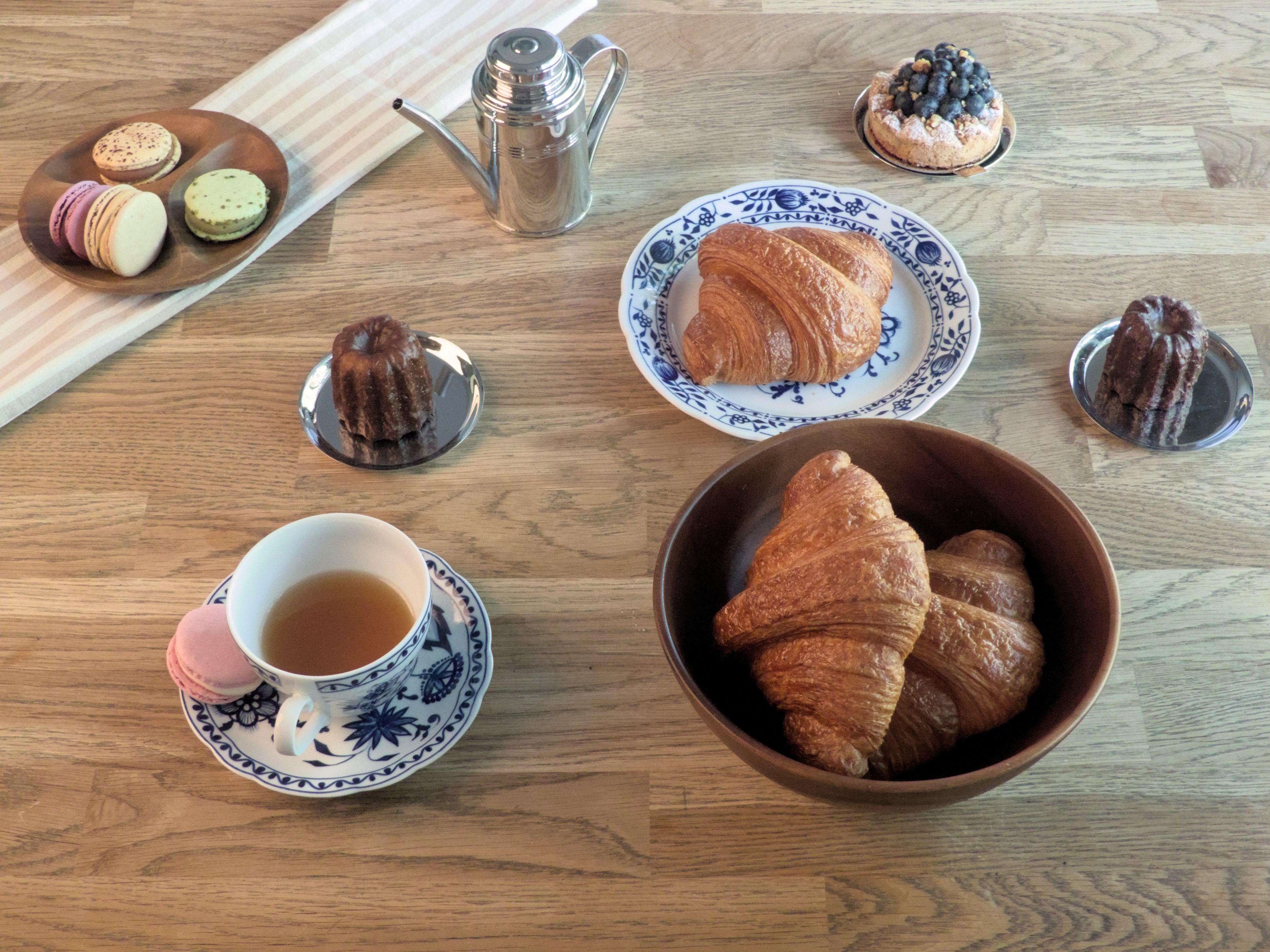 Elegant Breakfast Spread with Croissants and Pastries · Free Stock Photo