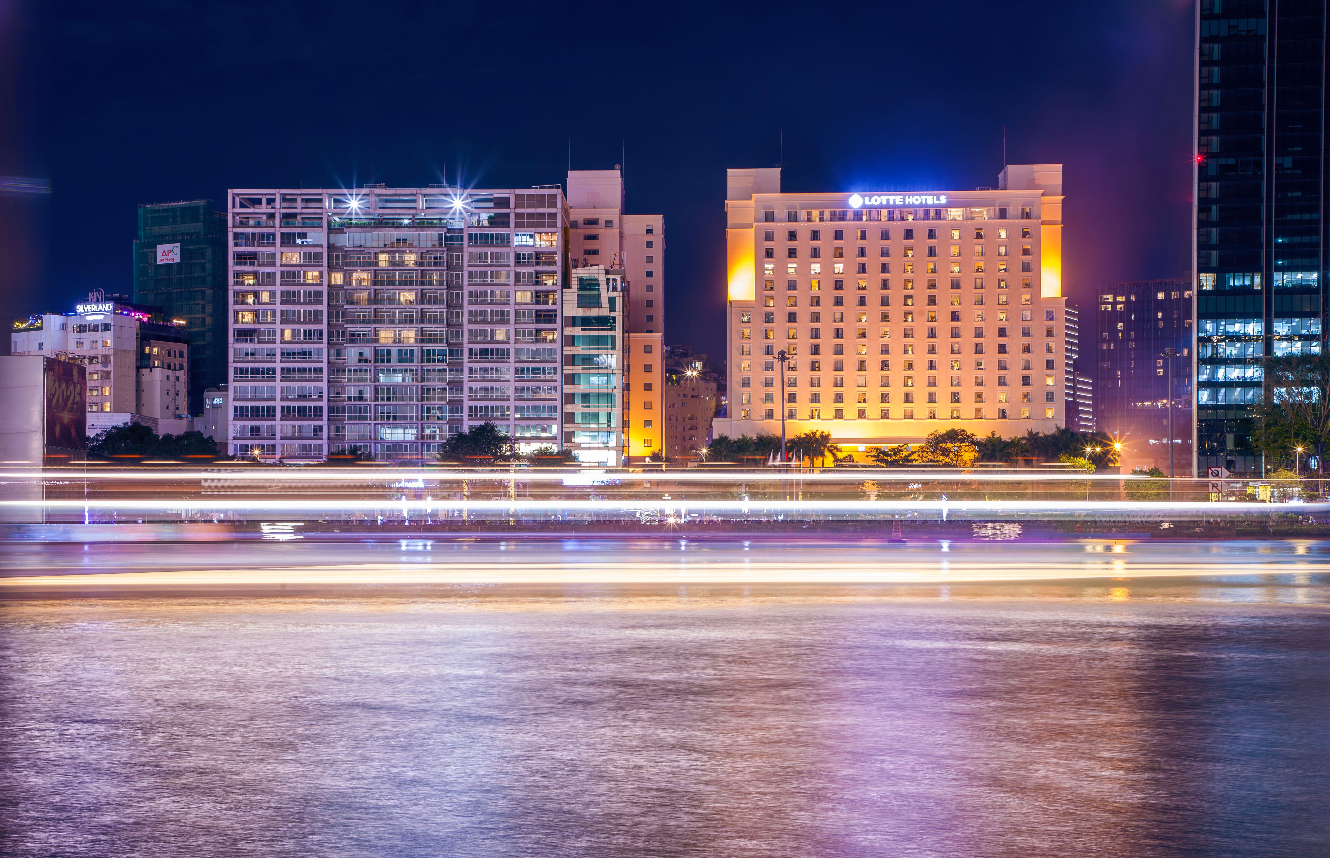 Lotte Hotels in Vibrant Night Cityscape · Free Stock Photo