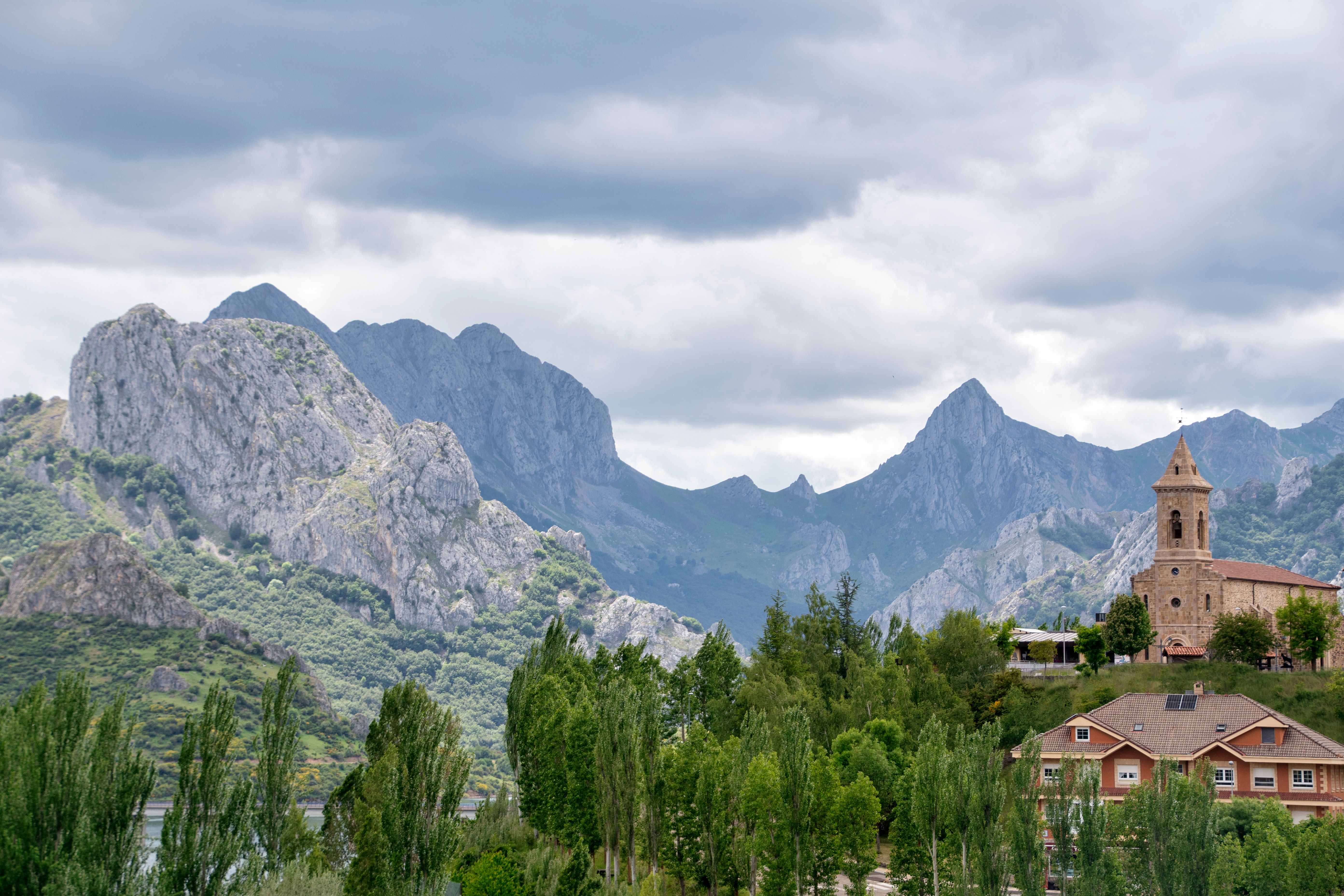 Scenic Spanish Landscape with Mountains and Church · Free Stock Photo