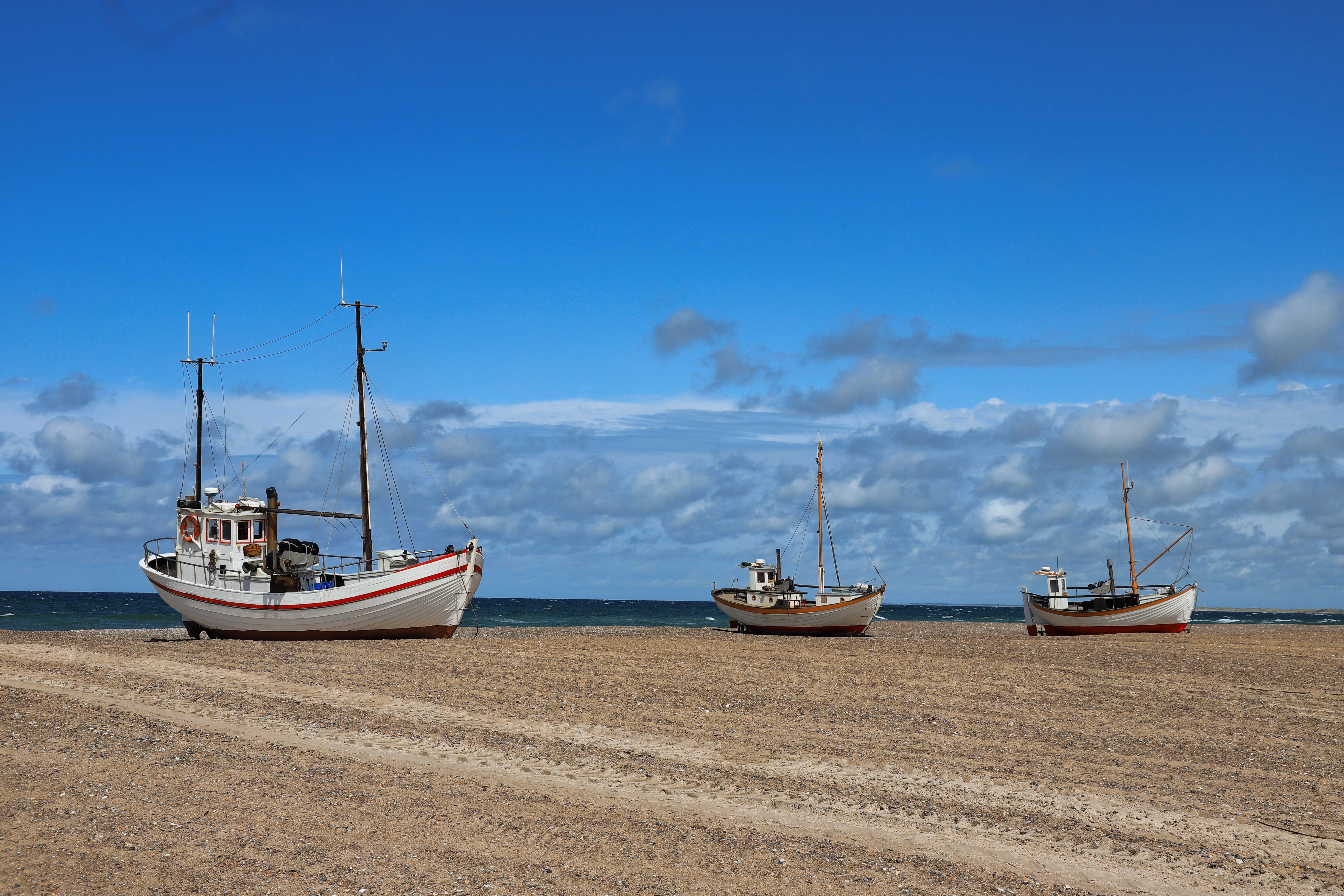 Fishing Boats on a Danish Sand Beach · Free Stock Photo