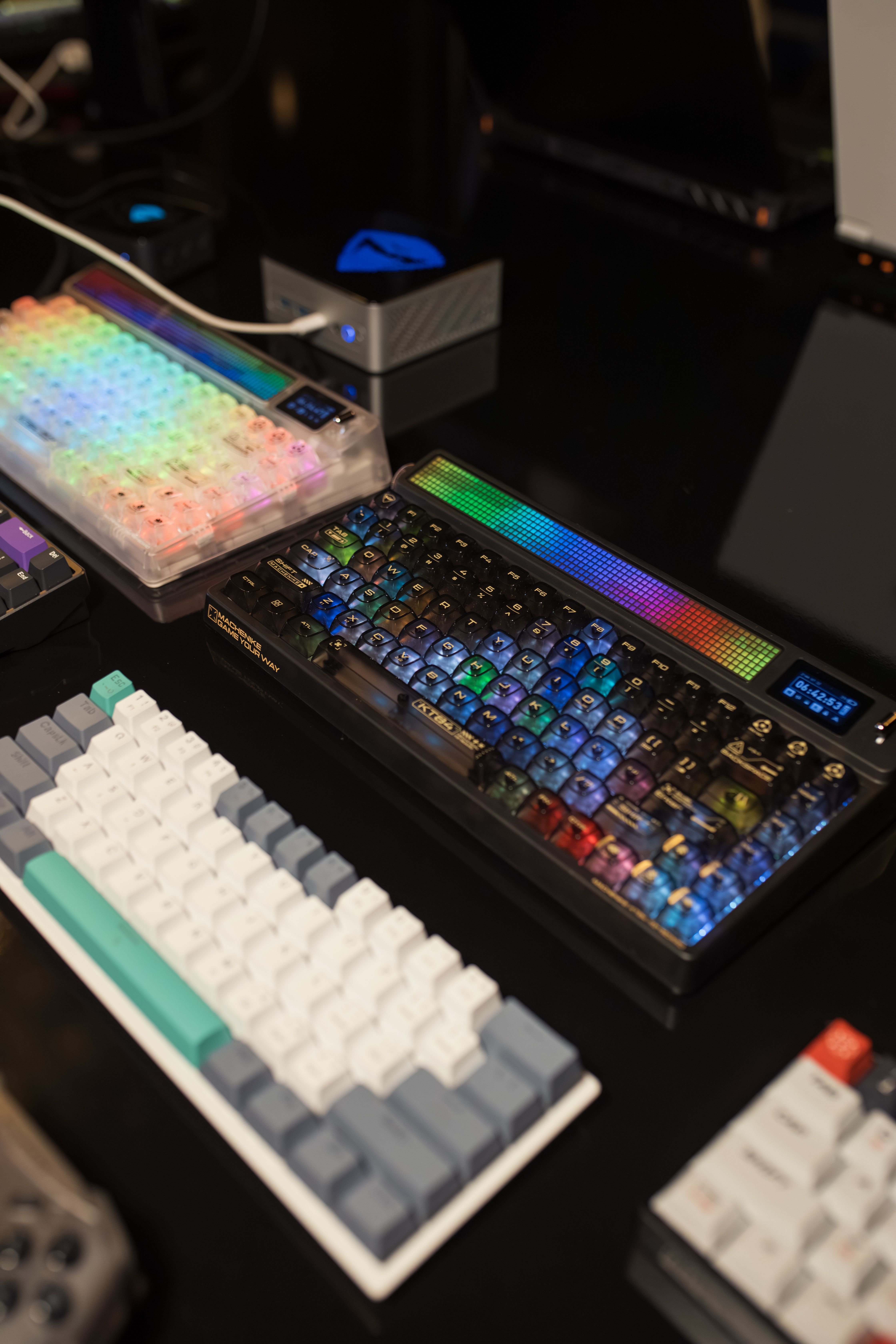 Colorful Mechanical Keyboards on Display Table · Free Stock Photo
