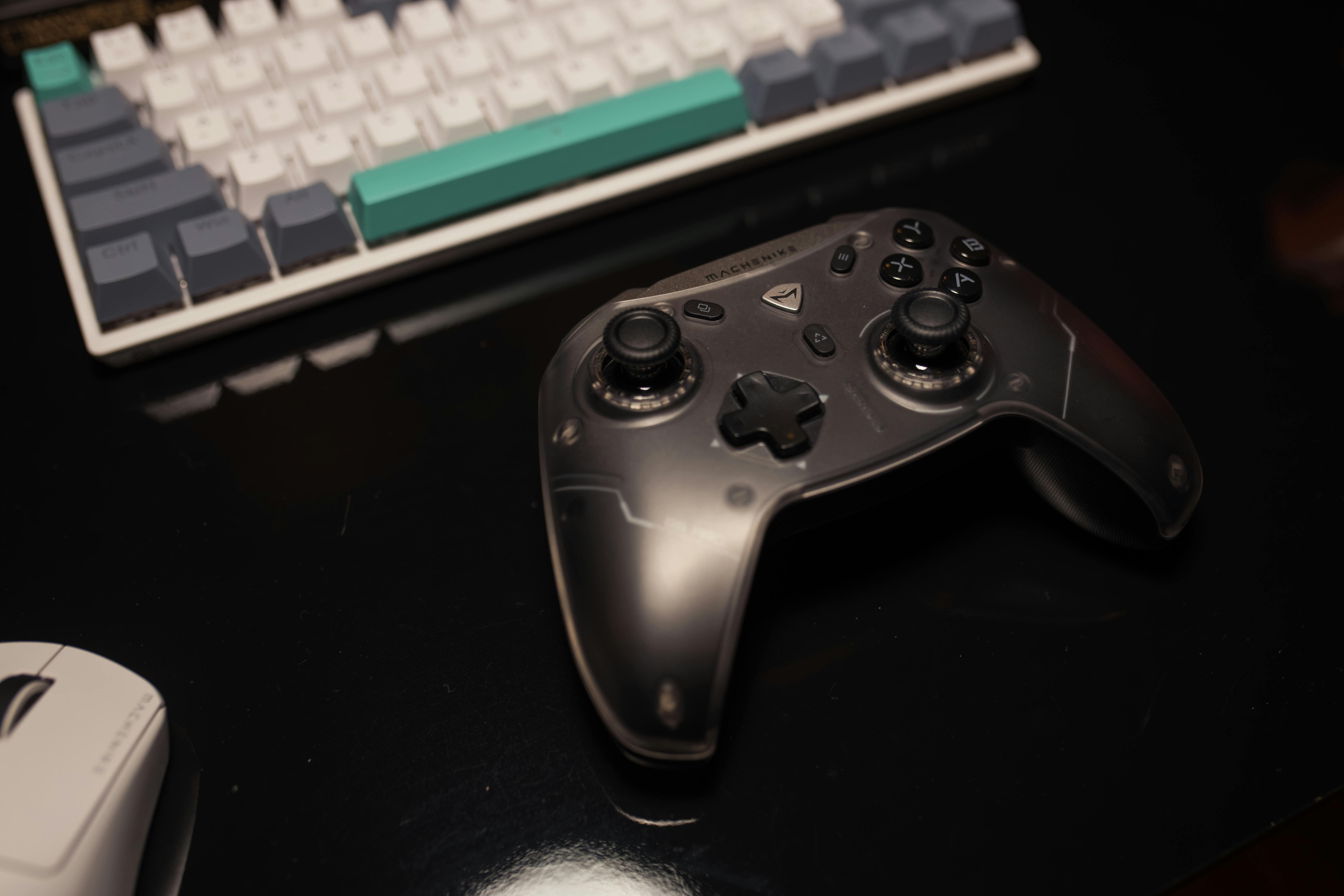 Modern Gaming Setup with Controller on Desk · Free Stock Photo
