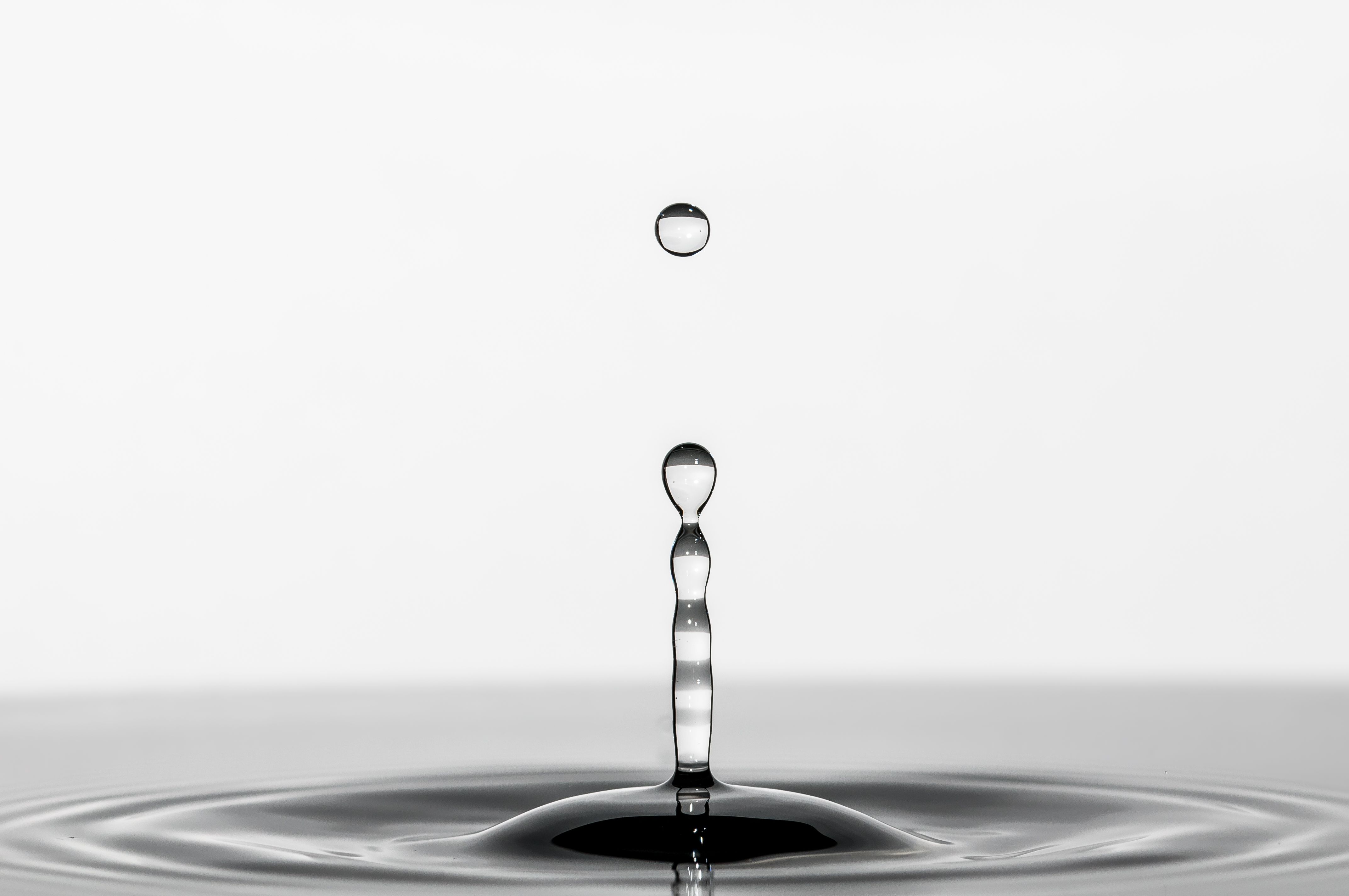 Macro Photography of a Stainless Steel Faucet · Free Stock Photo
