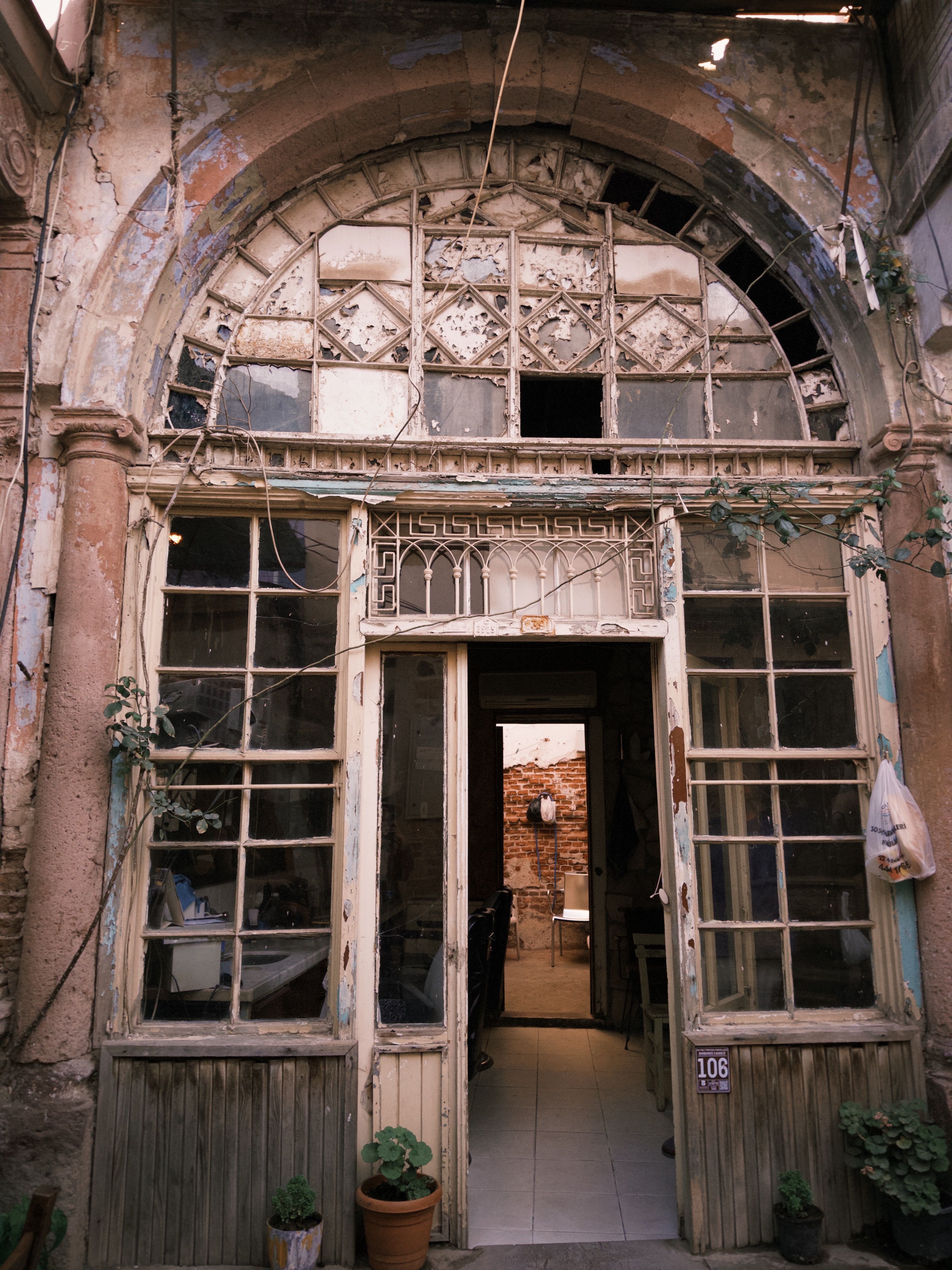 Antique Rustic Doorway in Weathered Building · Free Stock Photo