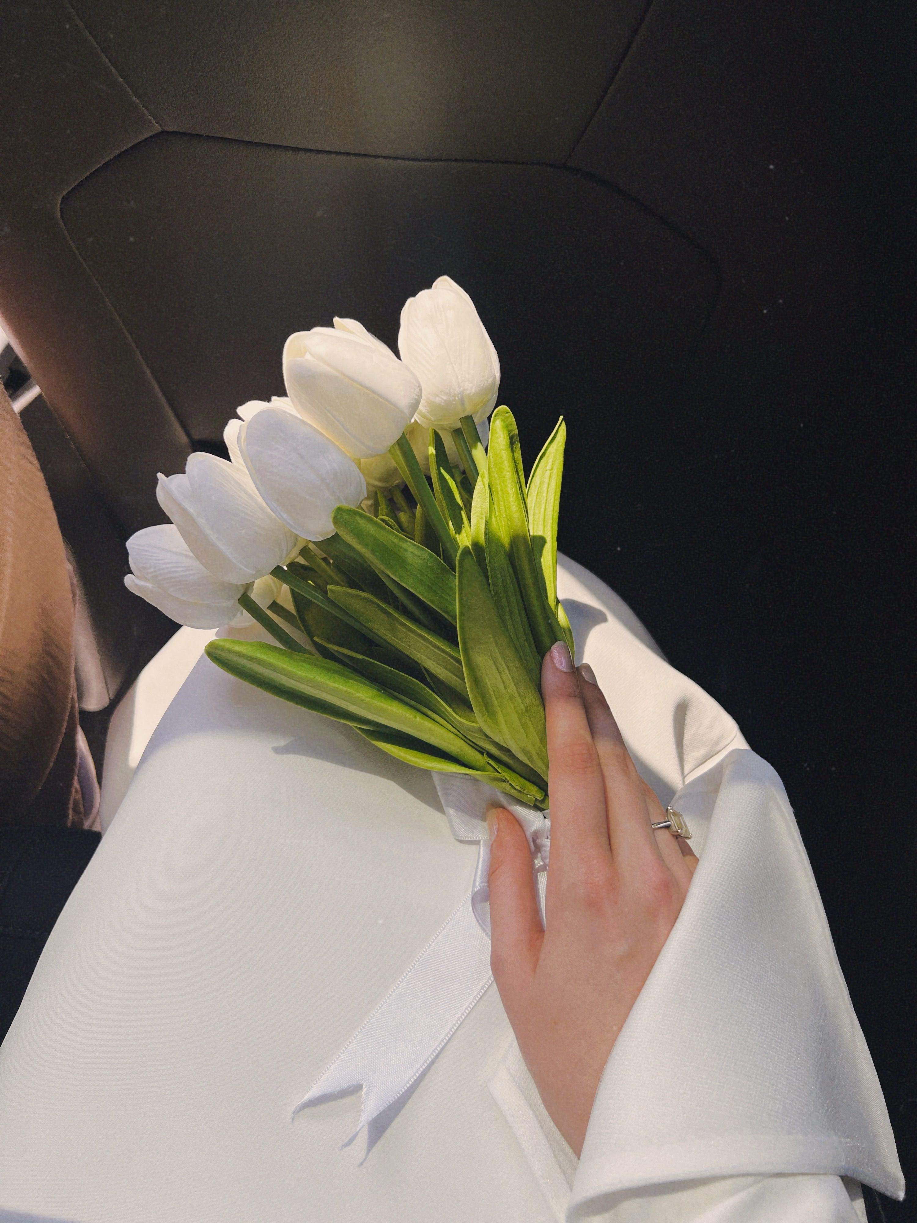 Bridal Bouquet of White Tulips in Car Interior · Free Stock Photo