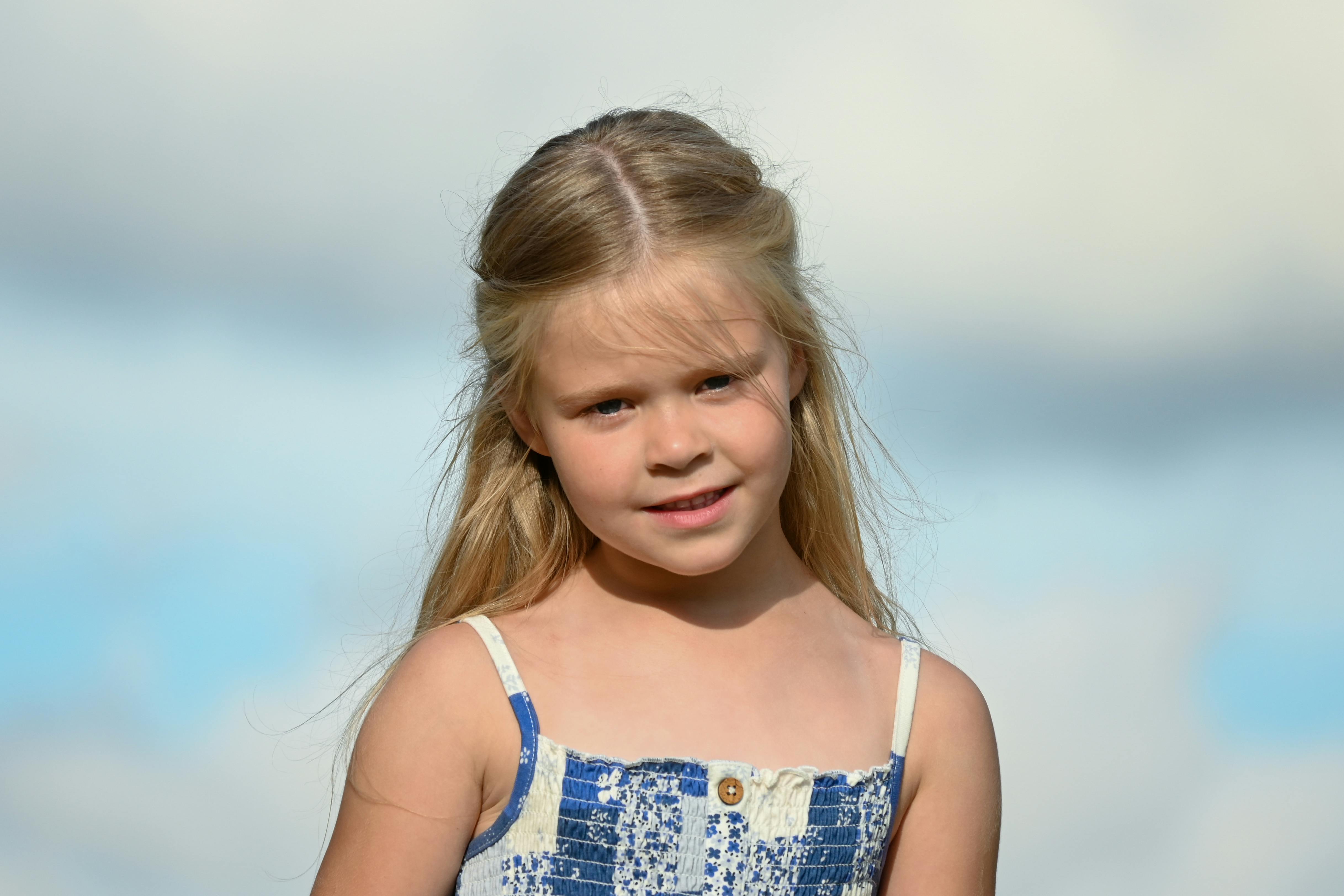 Portrait of Smiling Young Girl on Sunny Day · Free Stock Photo
