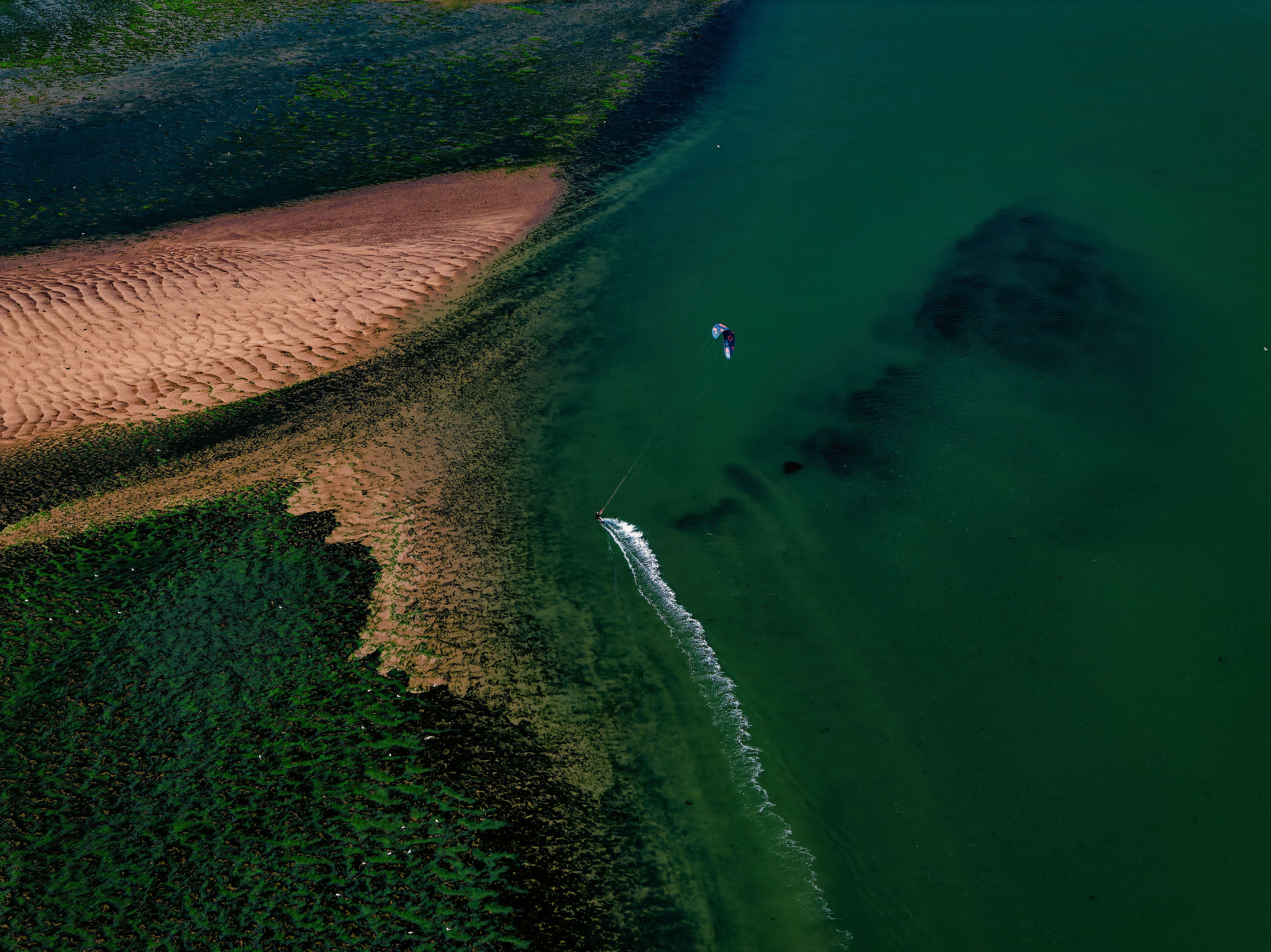 Aerial View of Kite Surfing in Exmouth Coastline · Free Stock Photo