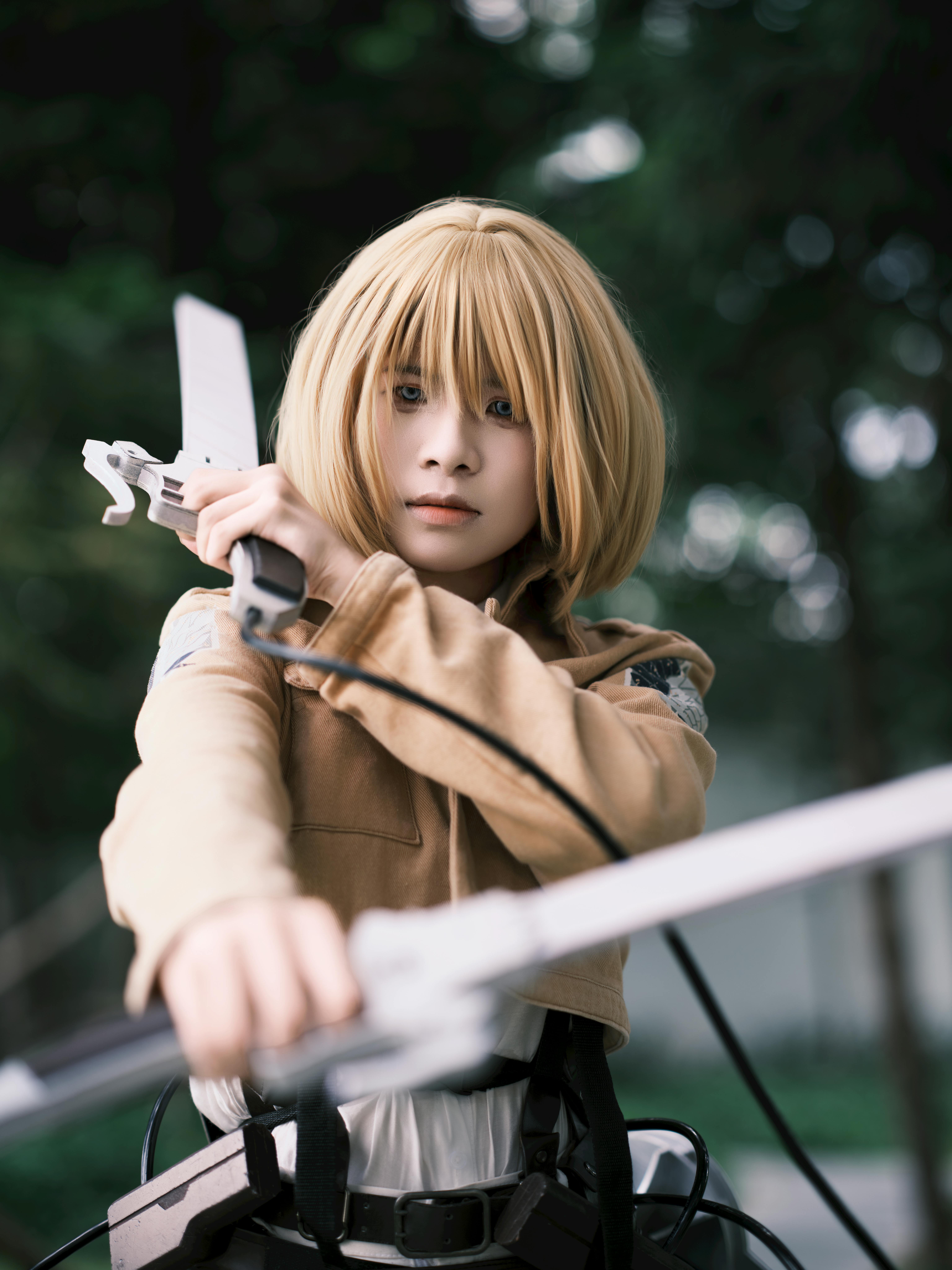 Dynamic Cosplay Character in Action Pose Outdoors · Free Stock Photo