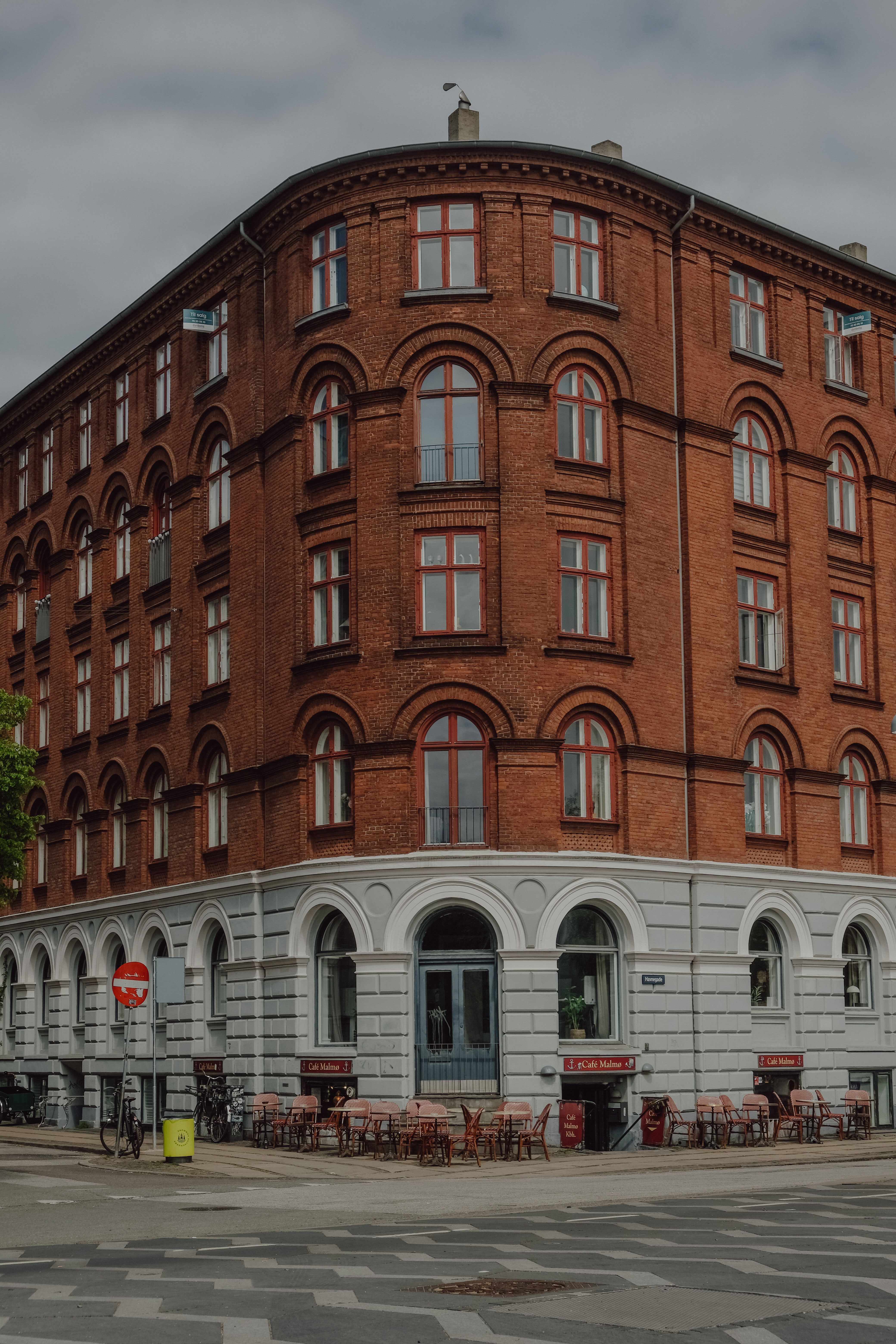 Historic Red Brick Building in Urban Setting · Free Stock Photo