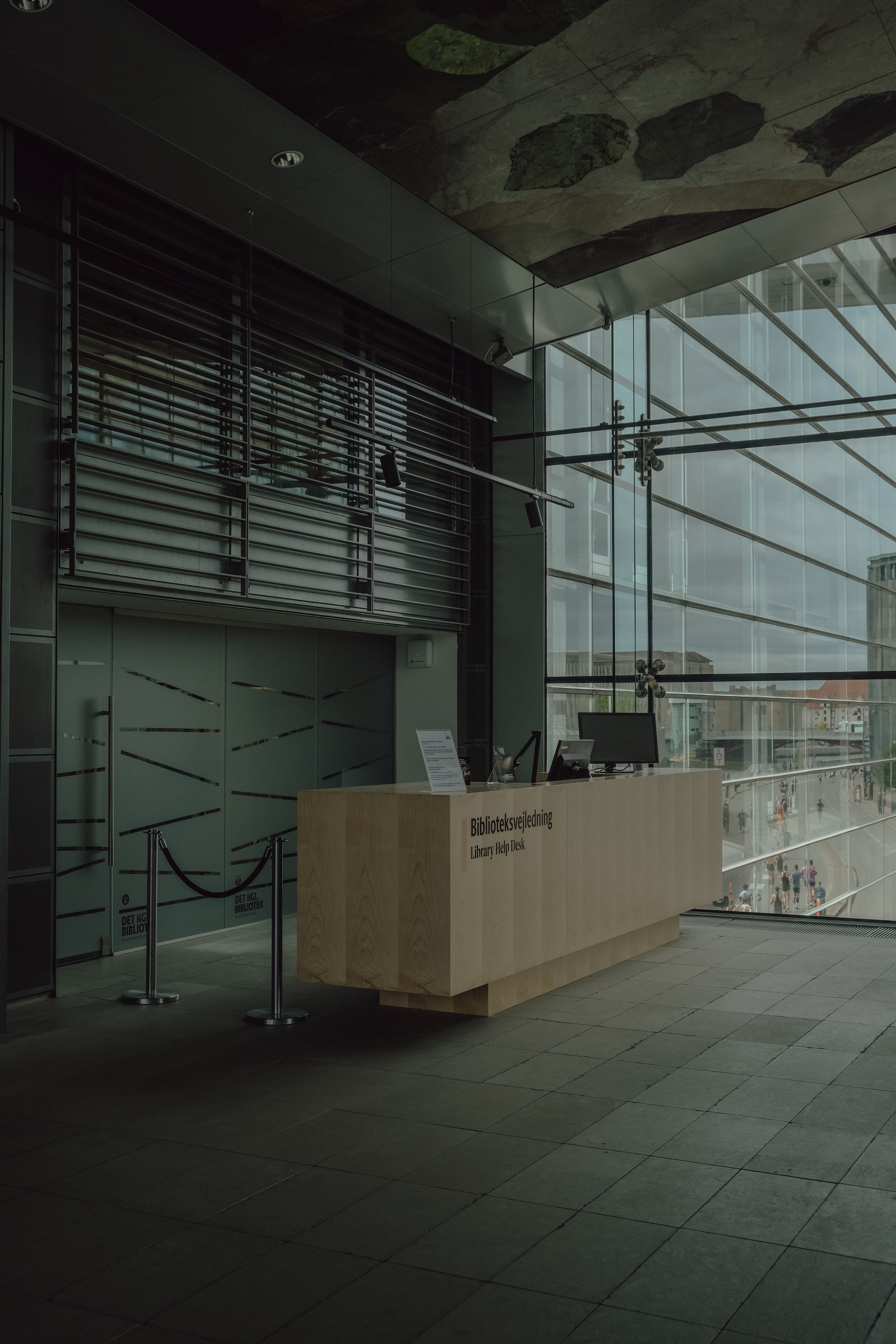 Modern Library Interior with Information Desk · Free Stock Photo