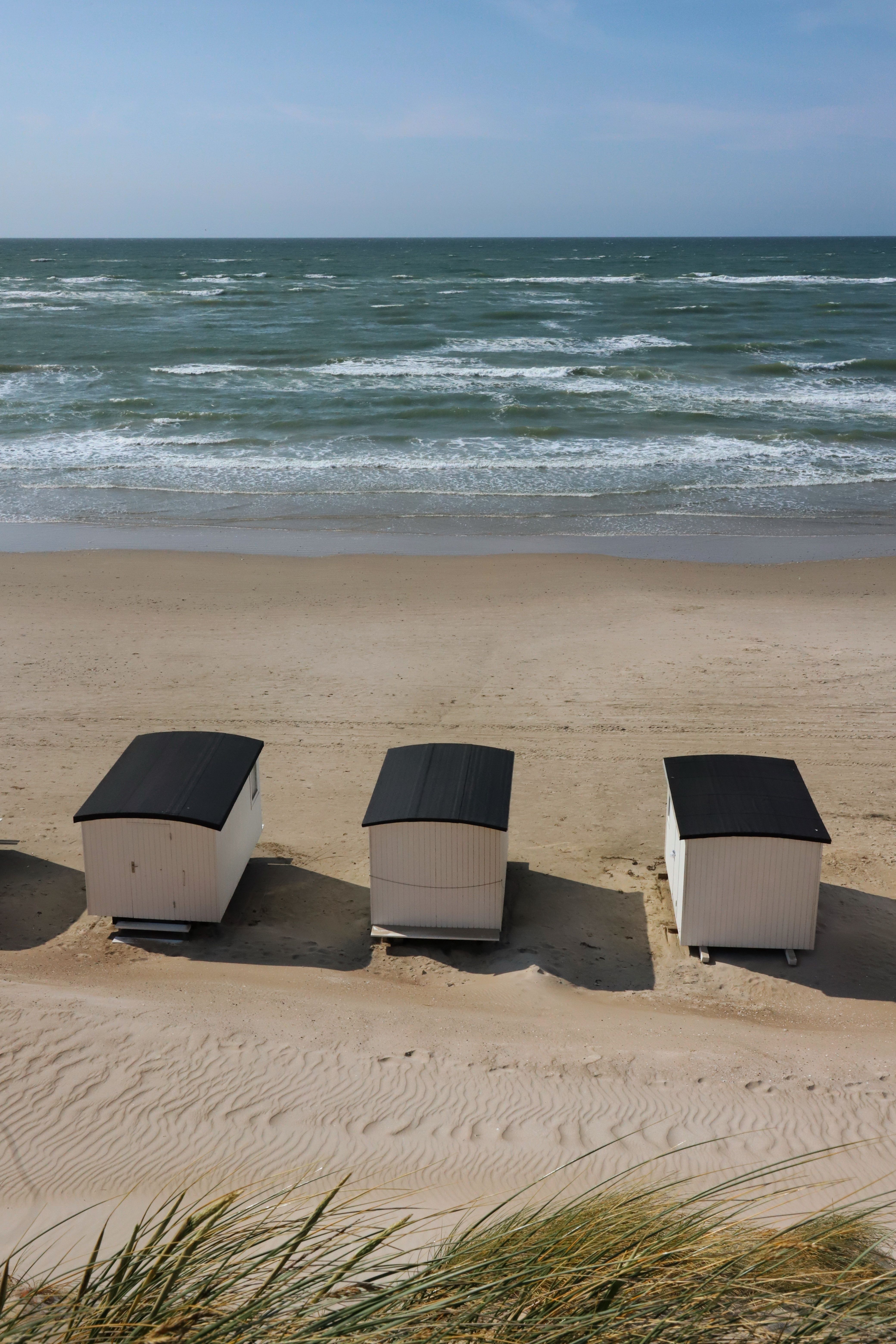 Scenic View of Danish Beach with Beach Huts · Free Stock Photo