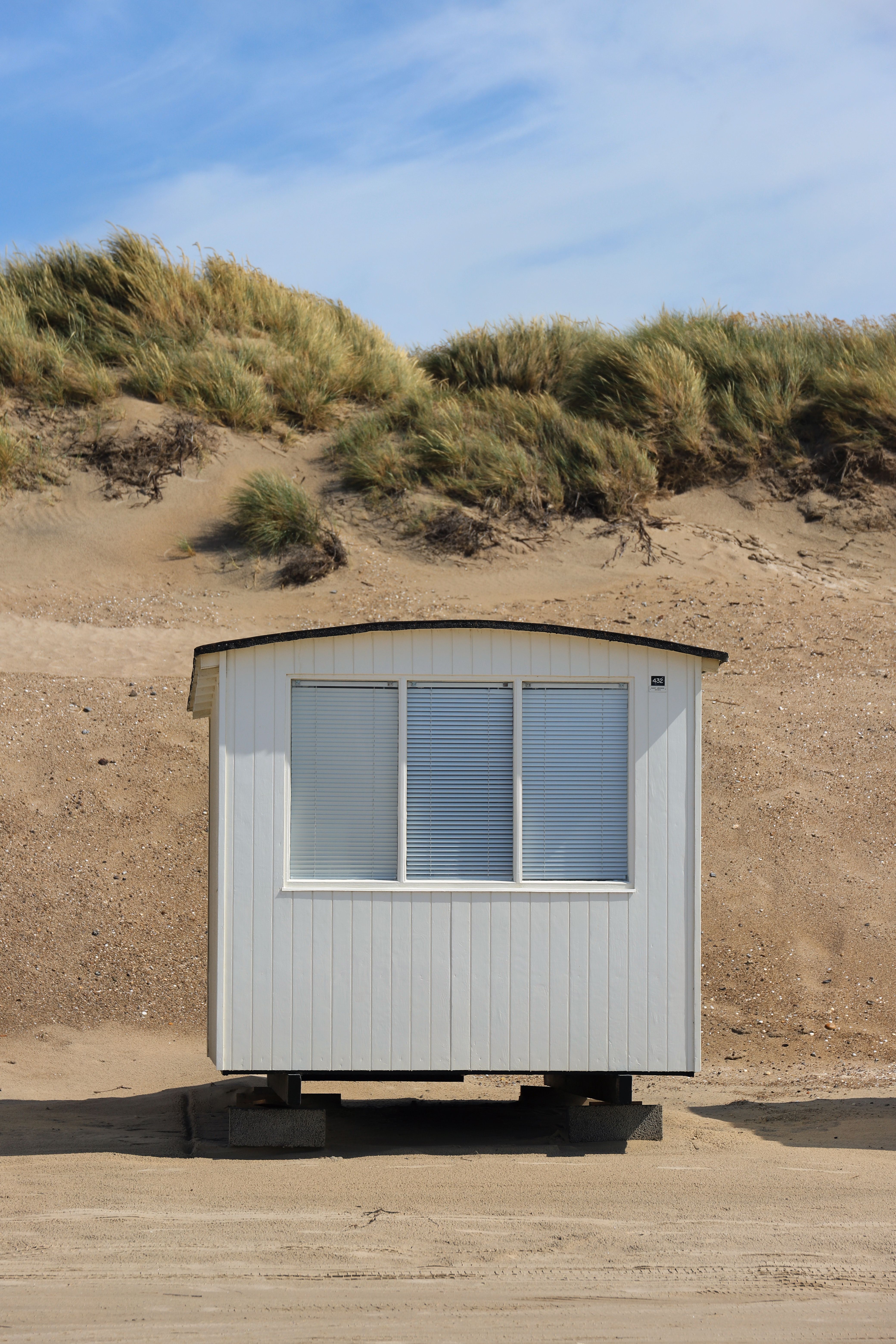 Charming Beach Hut on Danish Sand Dunes · Free Stock Photo