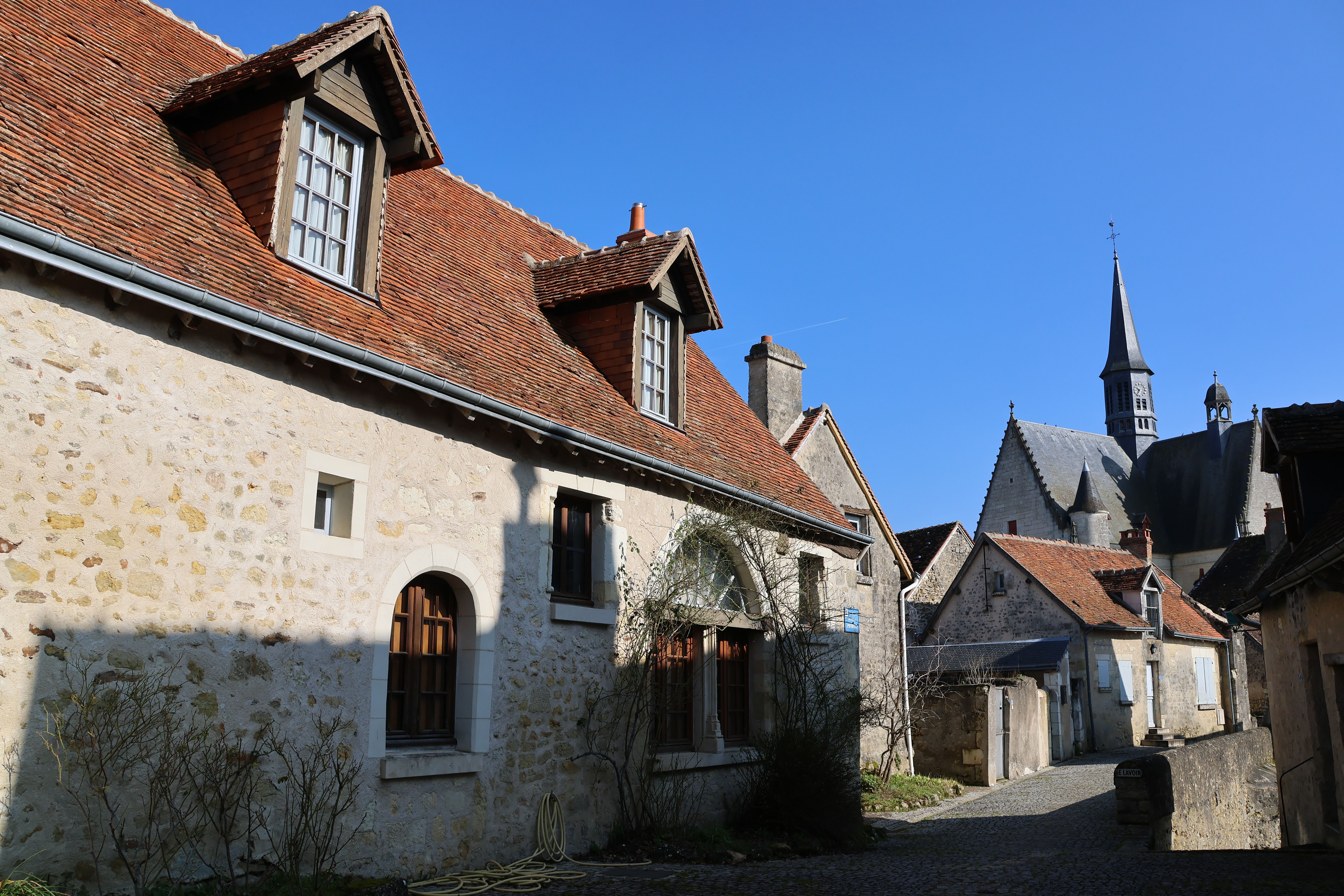 Charming French Village Scene with Historic Architecture · Free Stock Photo