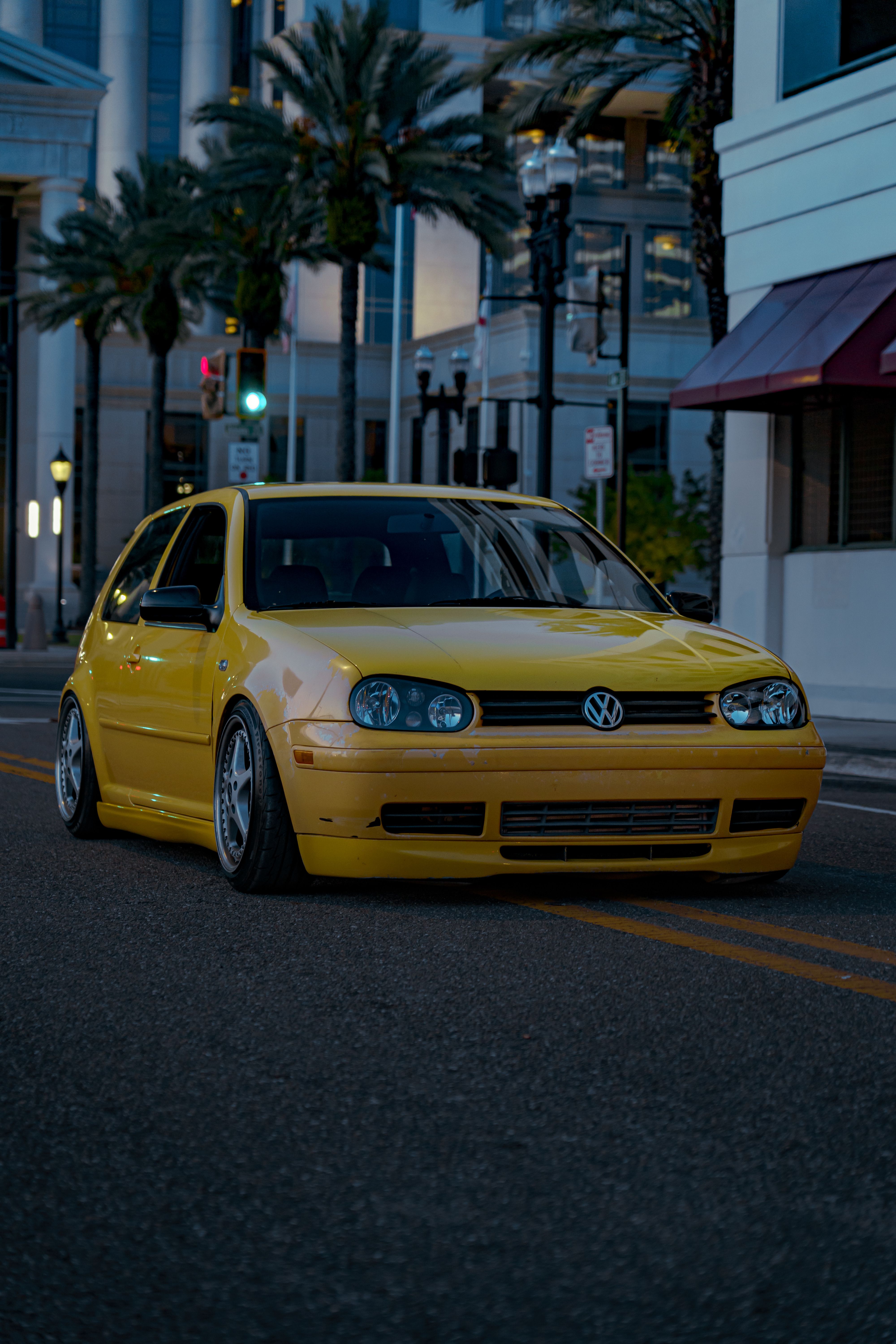 Yellow Volkswagen Car on Urban Street at Night · Free Stock Photo