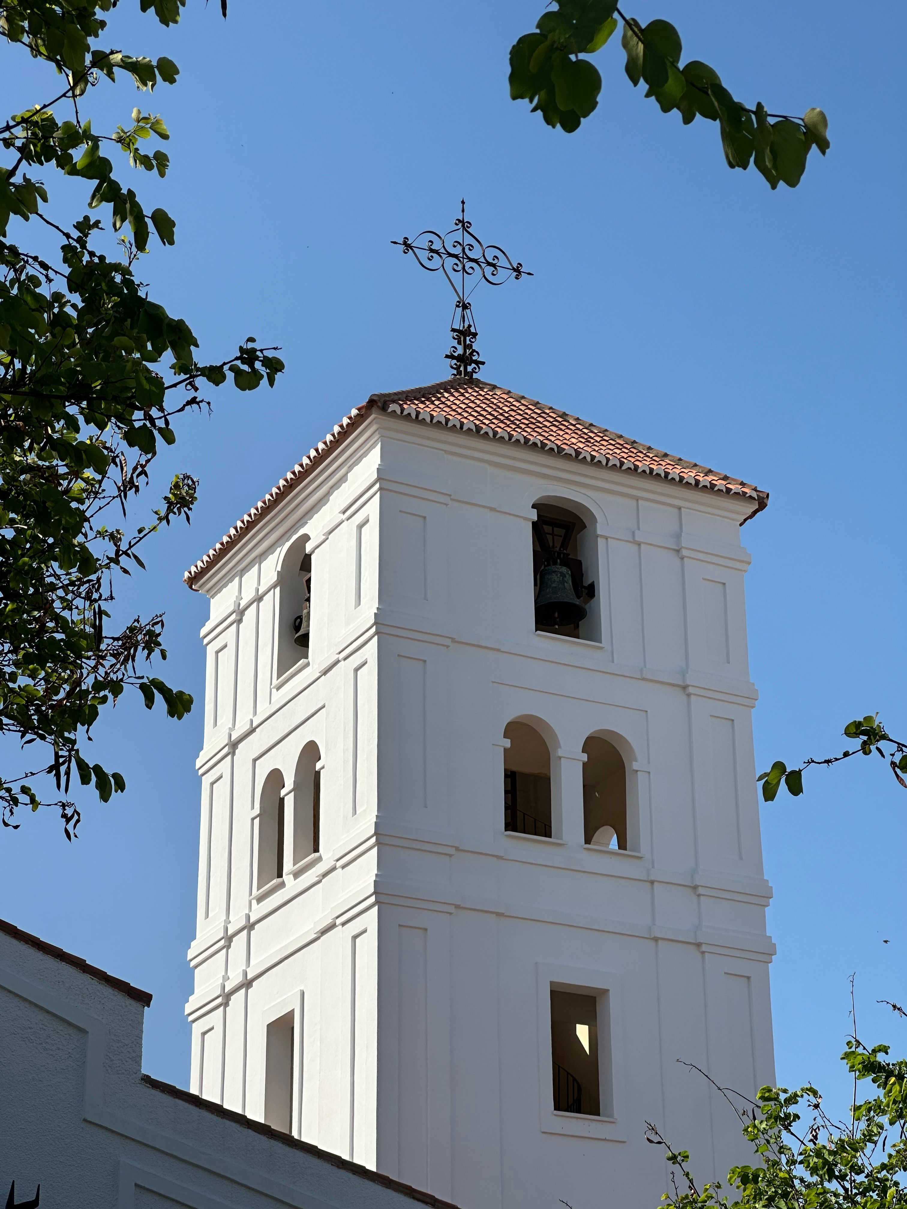 Historic Bell Tower Against Clear Blue Sky · Free Stock Photo
