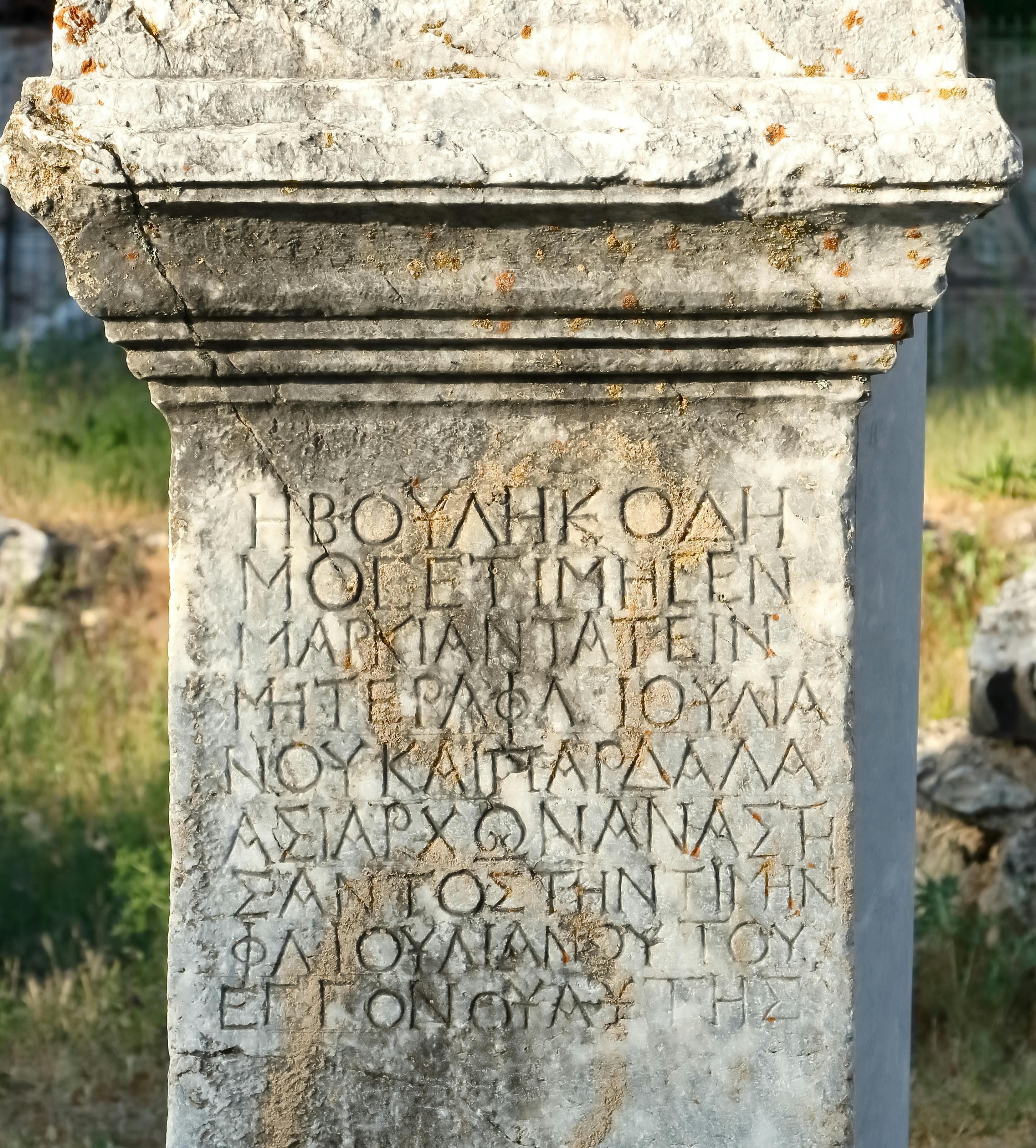 Ancient Greek Stone Inscription in Sunlight · Free Stock Photo