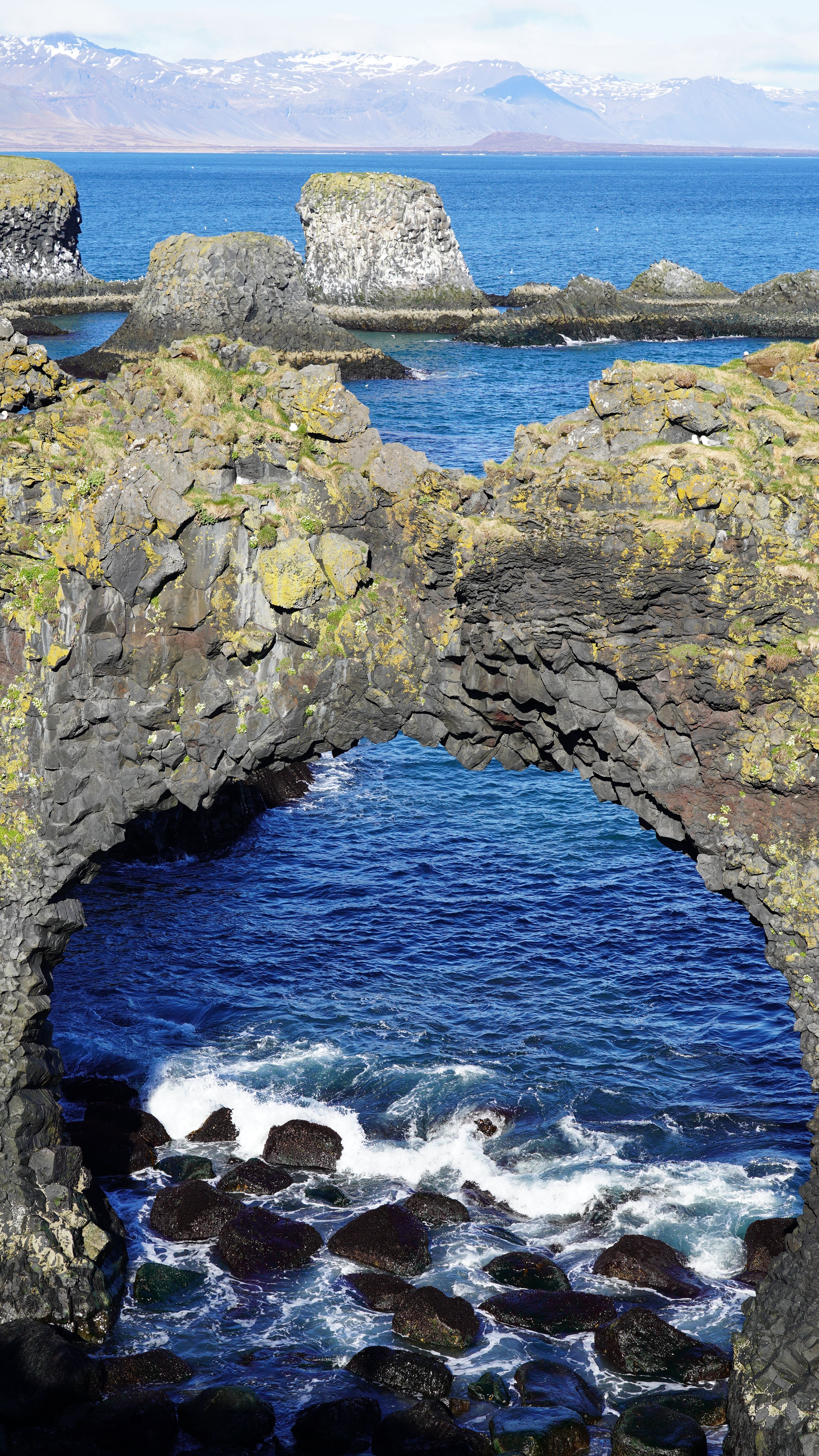 Stunning Basalt Arch by the Icelandic Coast · Free Stock Photo