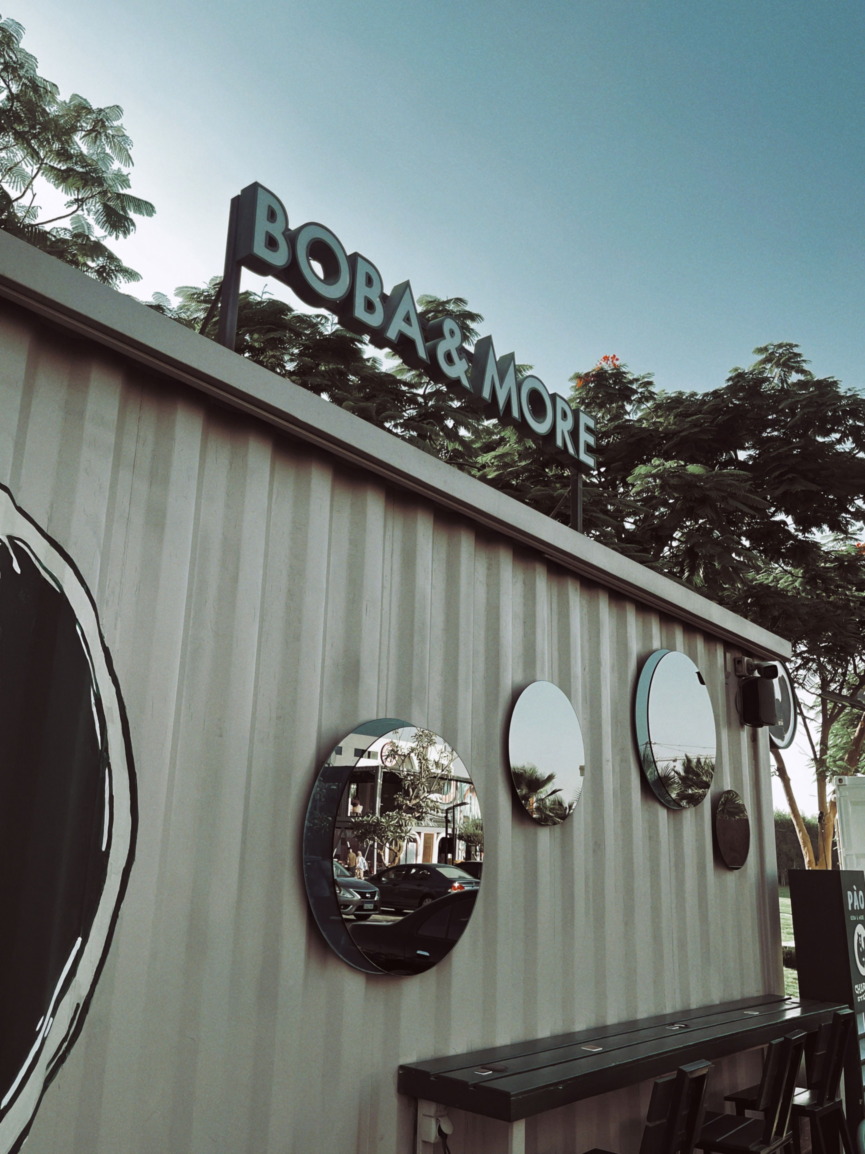 Modern Outdoor Boba & More Café in Urban Setting · Free Stock Photo