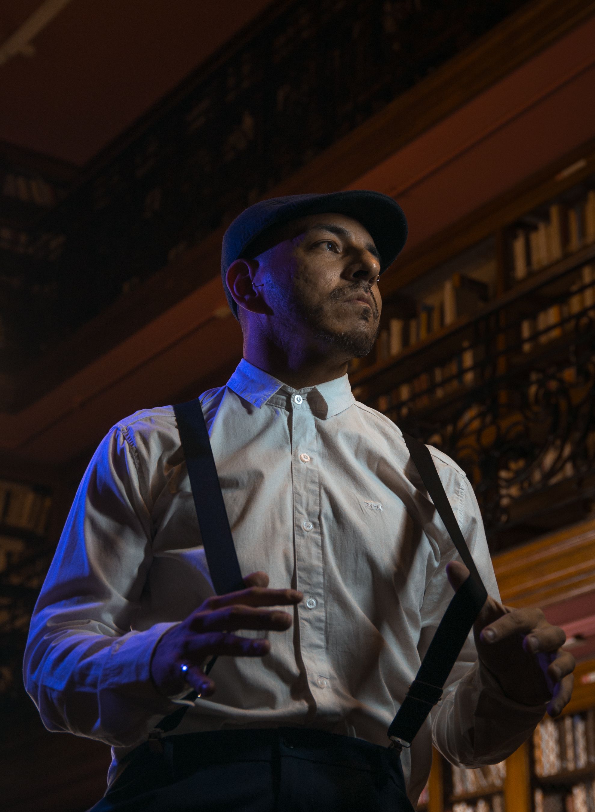 Vintage Style Portrait in Dimly Lit Library · Free Stock Photo