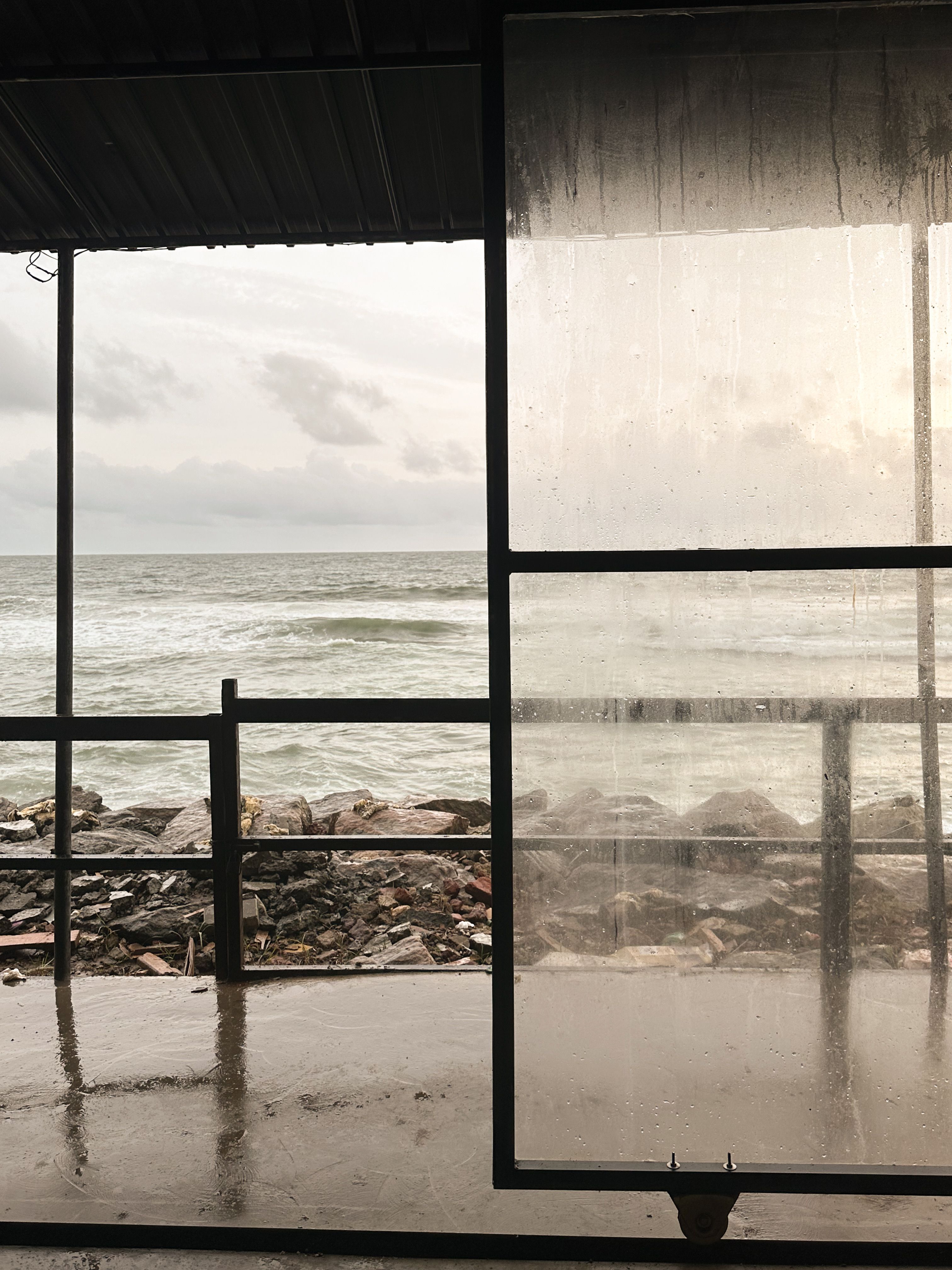 Rustic Seaside View Through Wet Window · Free Stock Photo