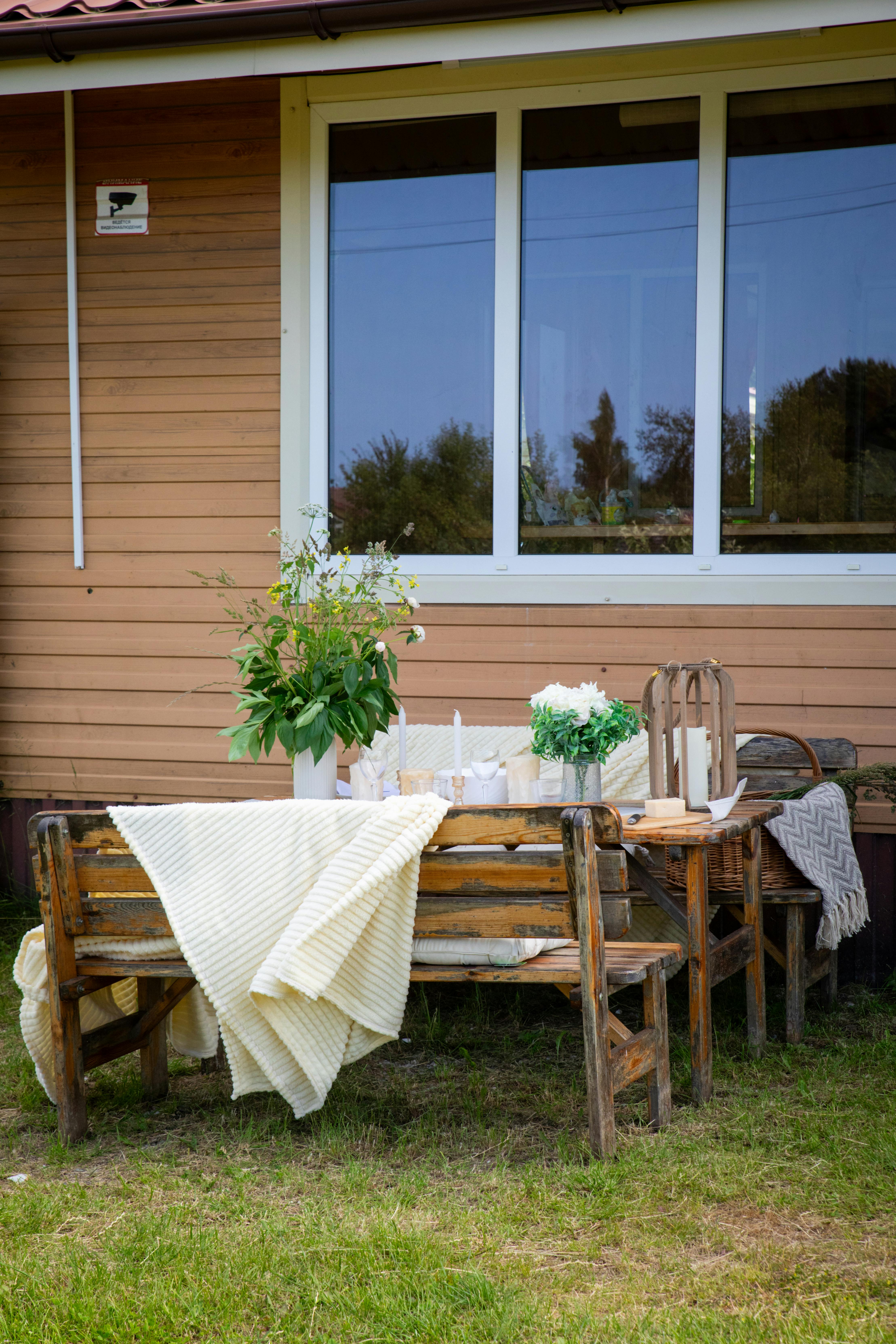 Rustic Outdoor Dining with Wooden Furniture · Free Stock Photo