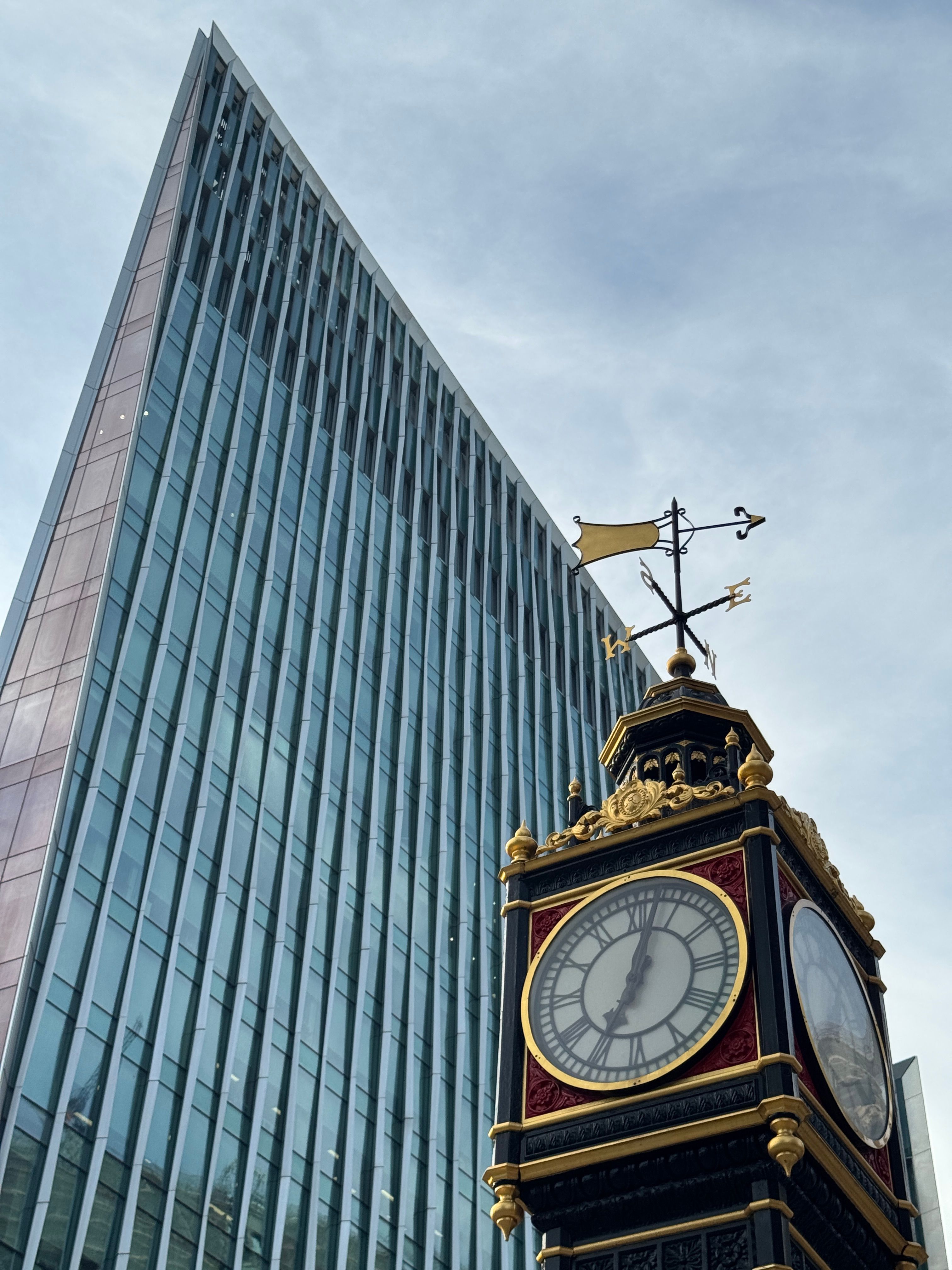 Historic Clock Tower and Modern Office Building Contrast · Free Stock Photo